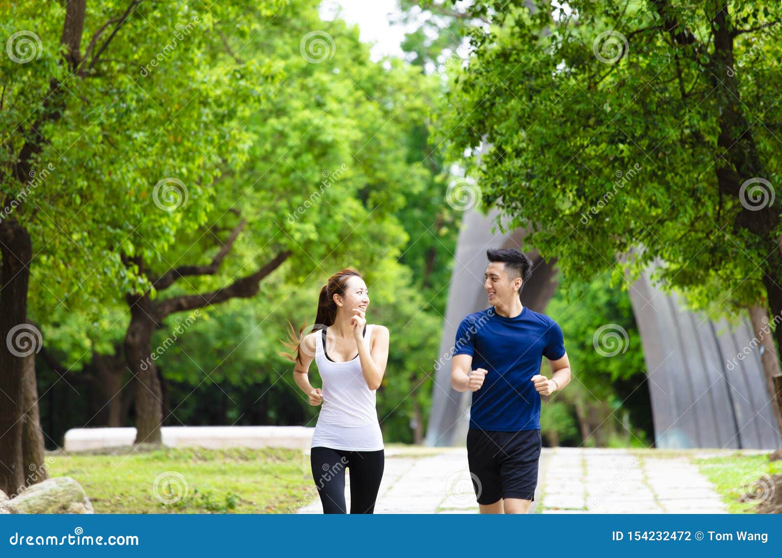 Happy Couple Jogging and Running in Nature Stock Photo - Image of ...