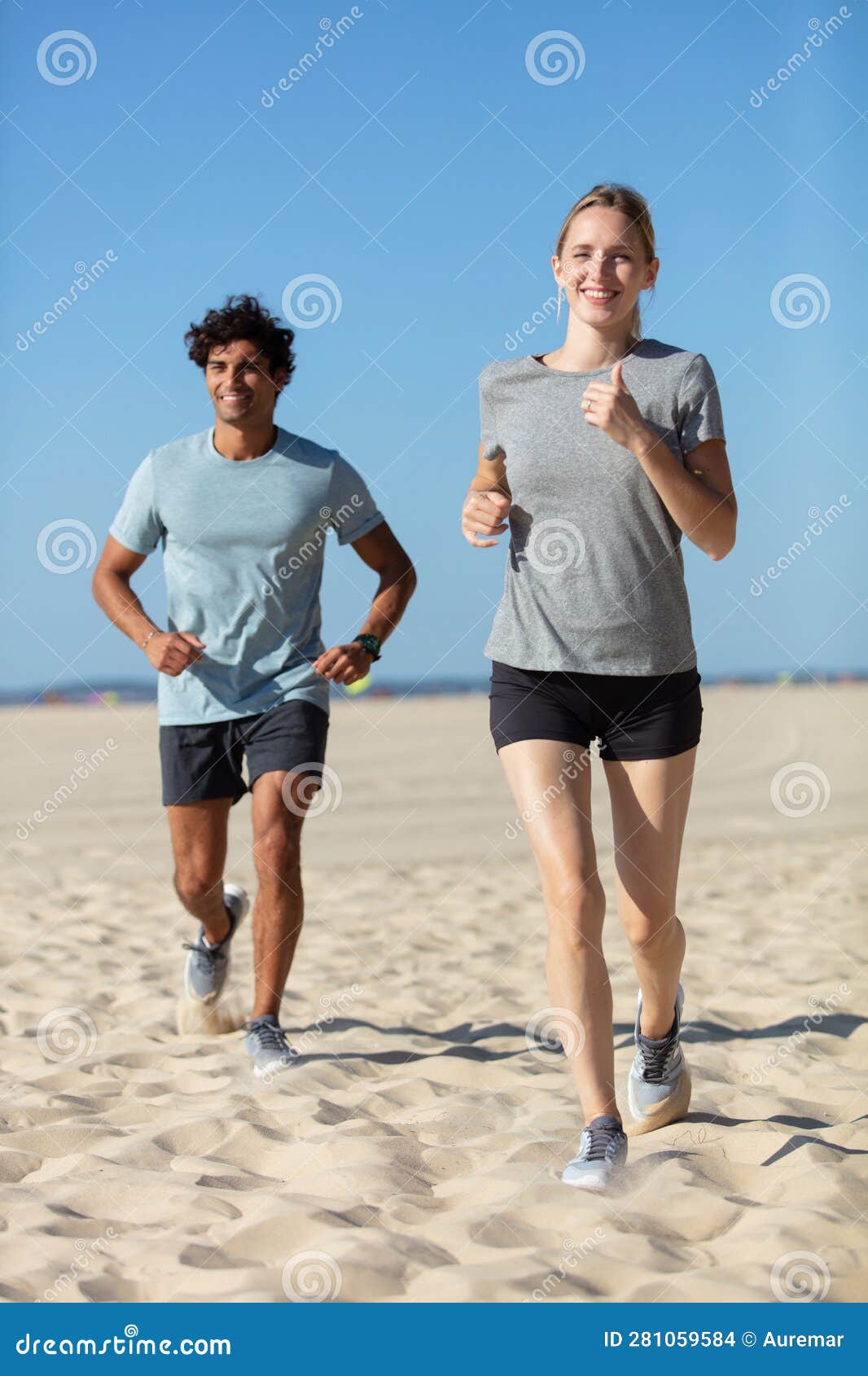 Happy Couple Jogging on Sand Stock Photo - Image of healthcare, person ...