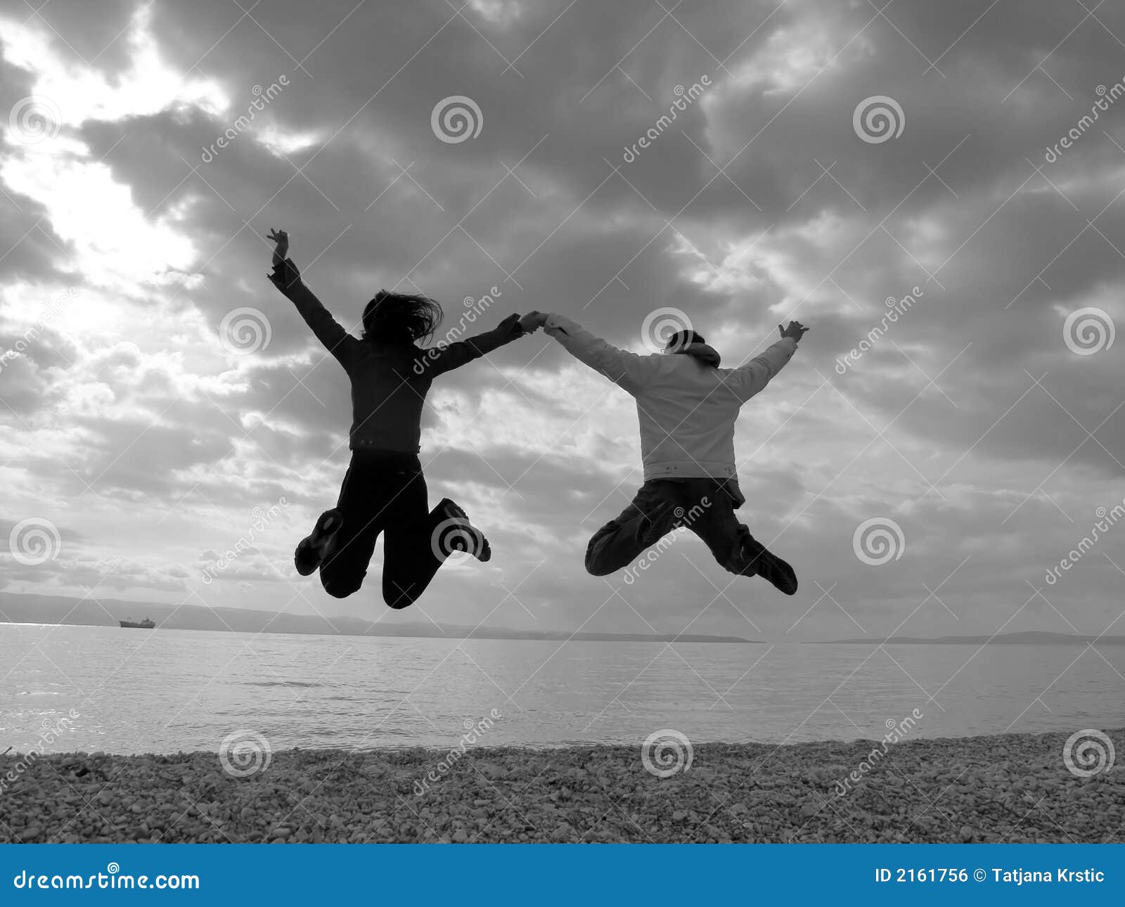 Happy Couple Jumping stock photo. Image of people, enjoyment - 2161756