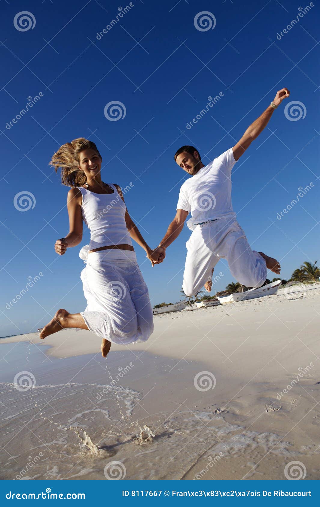 Happy couple jumping stock image. Image of caucasian, boyfriend - 8117667