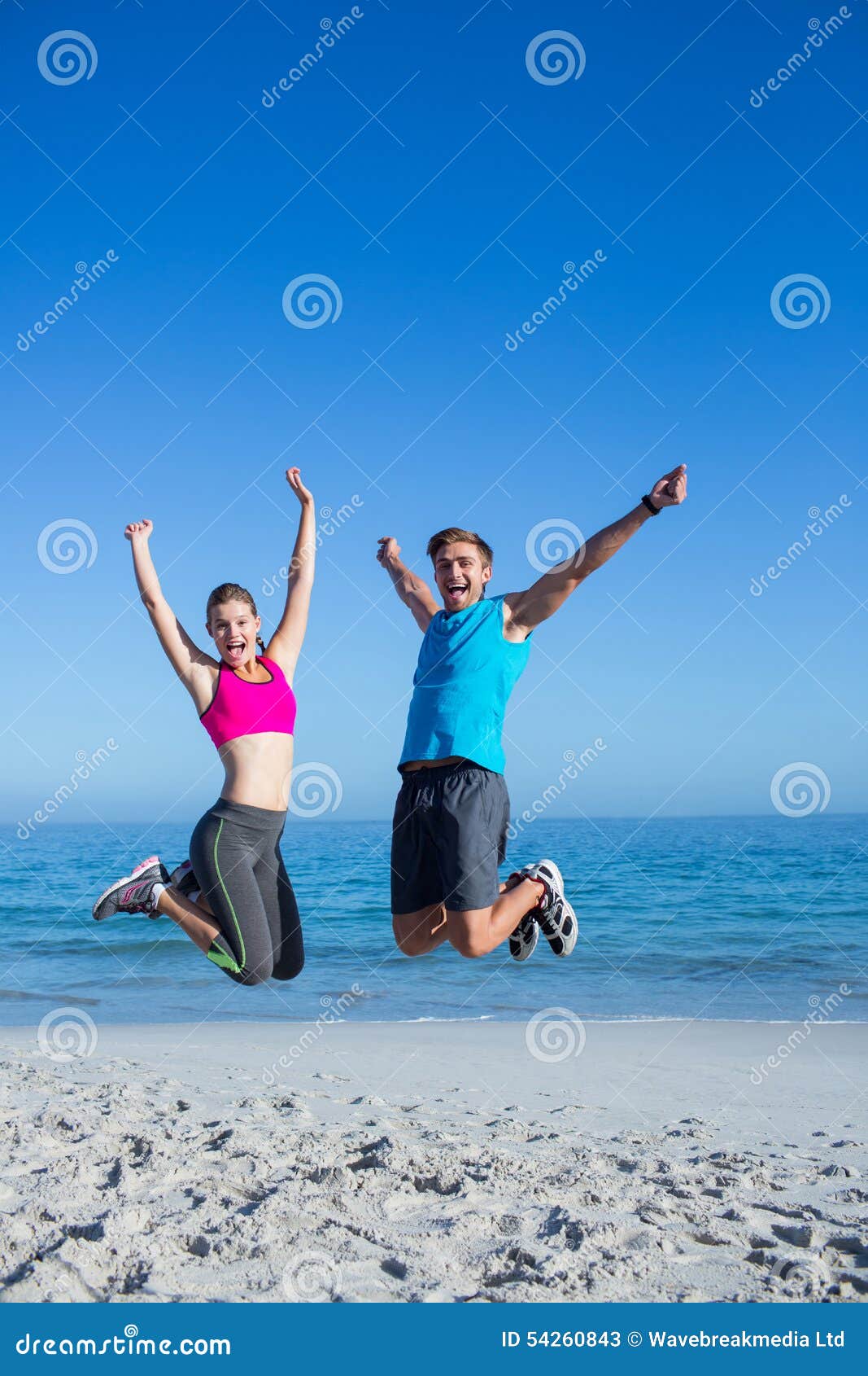 Happy Couple Jumping Together Stock Image - Image of female, people ...