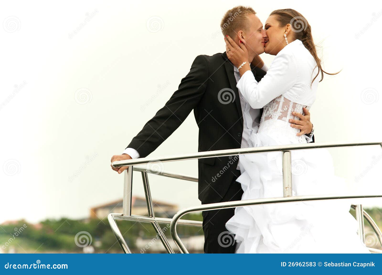 Happy couple kissing stock image. Image of bliss, lace - 26962583