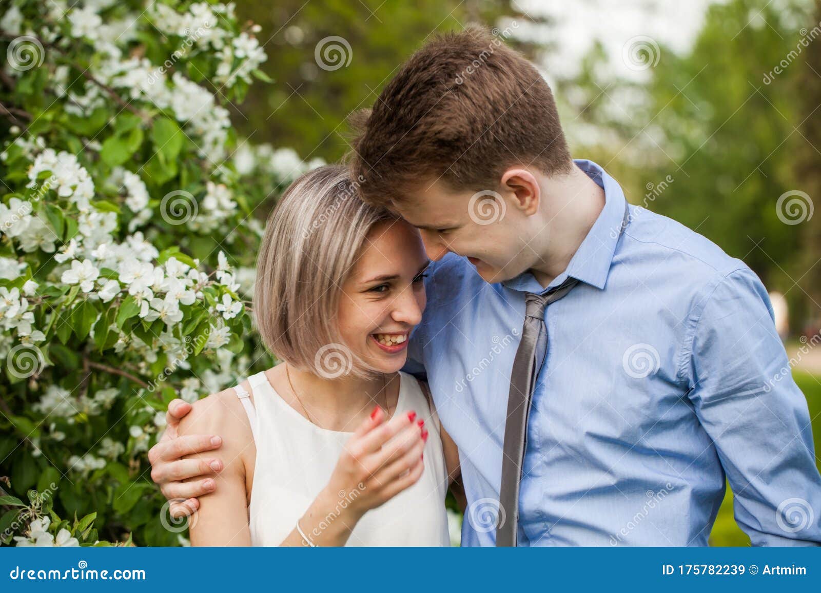 Happy Couple Laughing Together in Park Stock Image - Image of face ...
