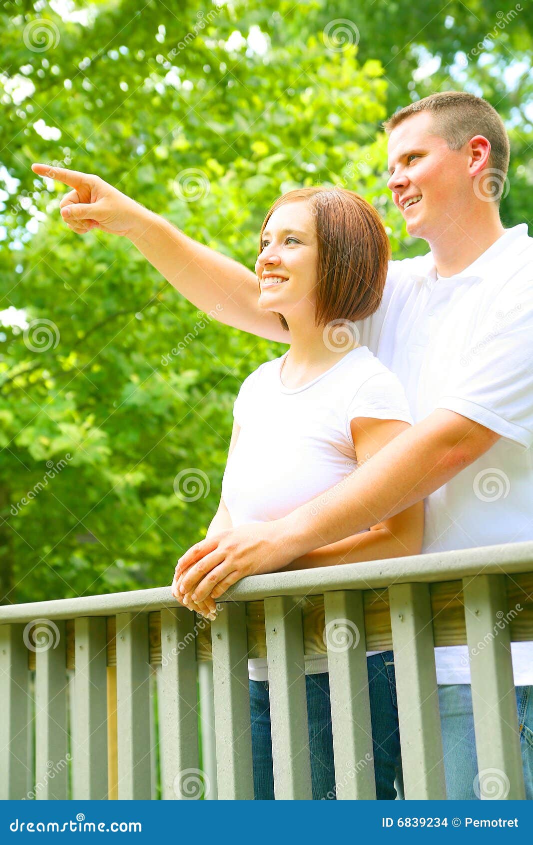 Happy Couple Looking Over stock photo. Image of heart - 6839234