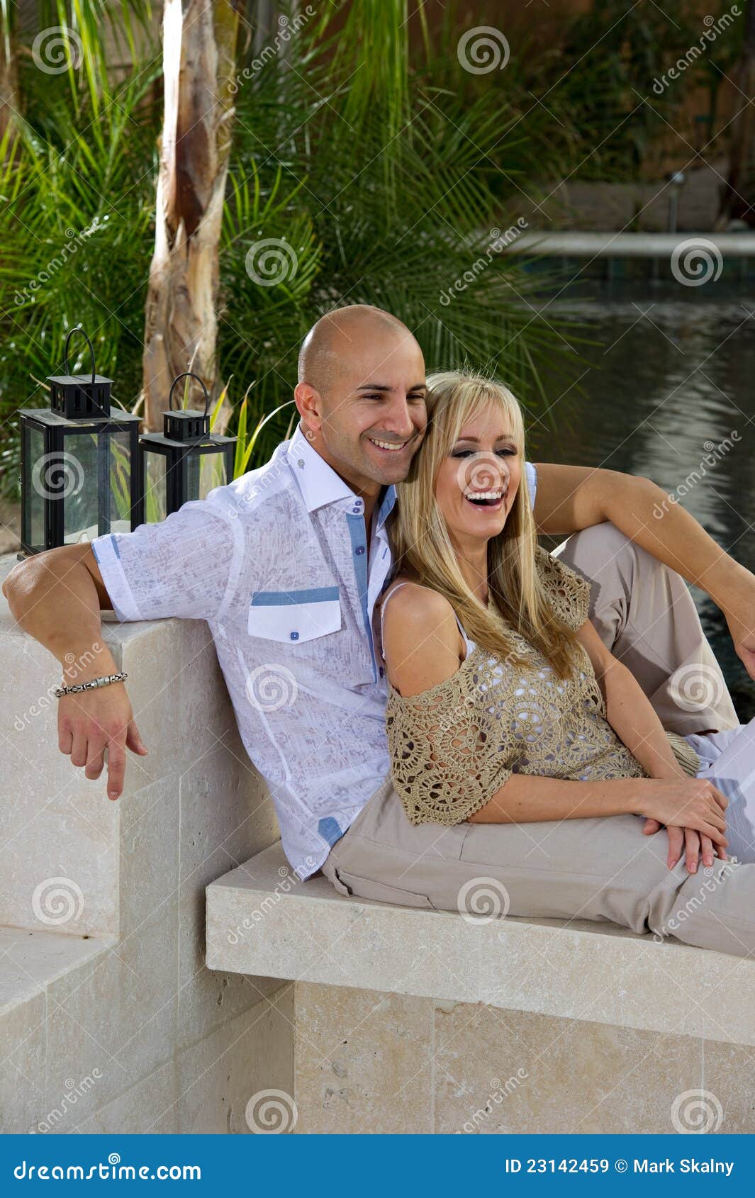 Happy Couple Lounging by the Pool Stock Image - Image of cheerful ...