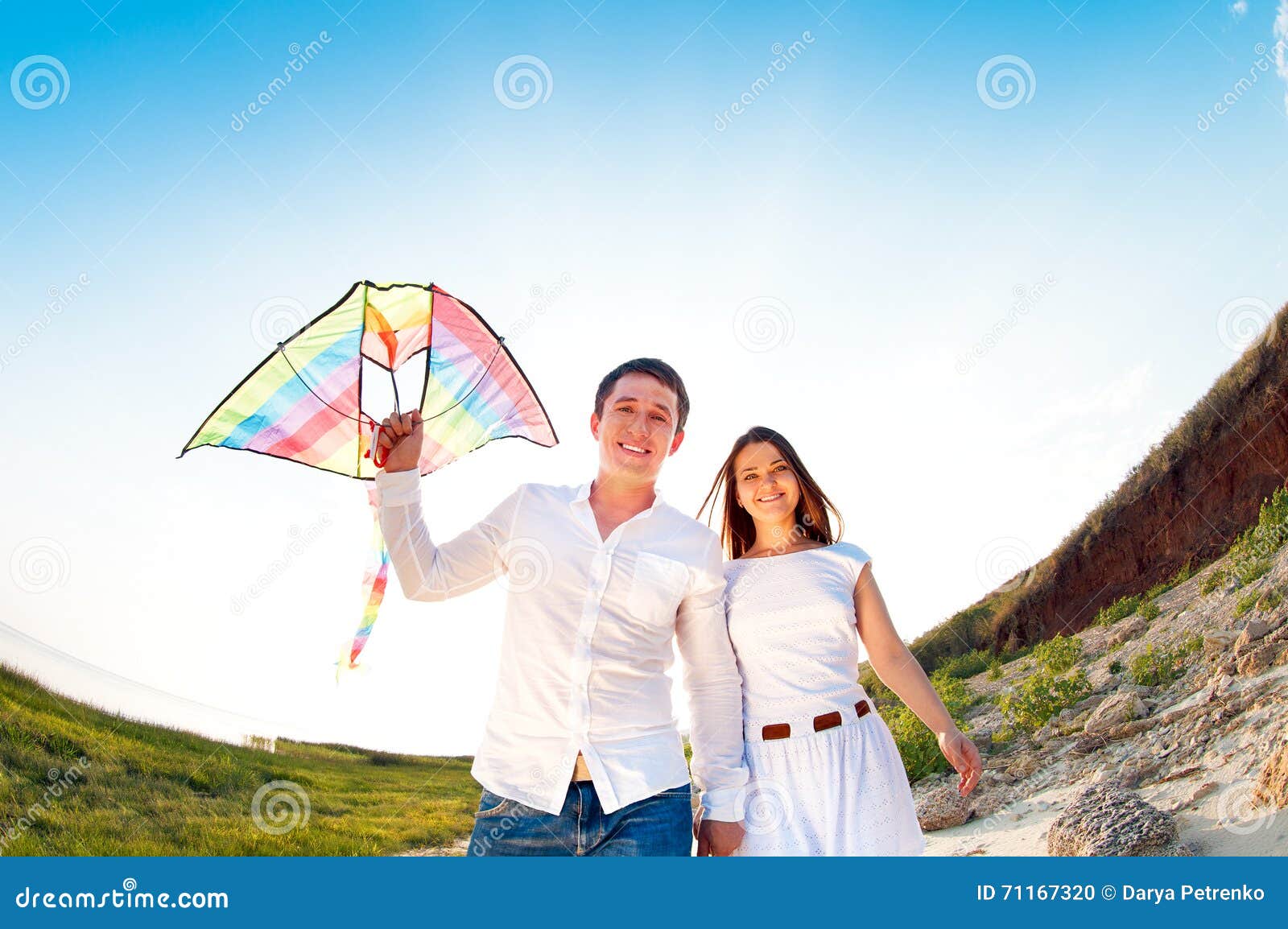 Couples Flying Kites
