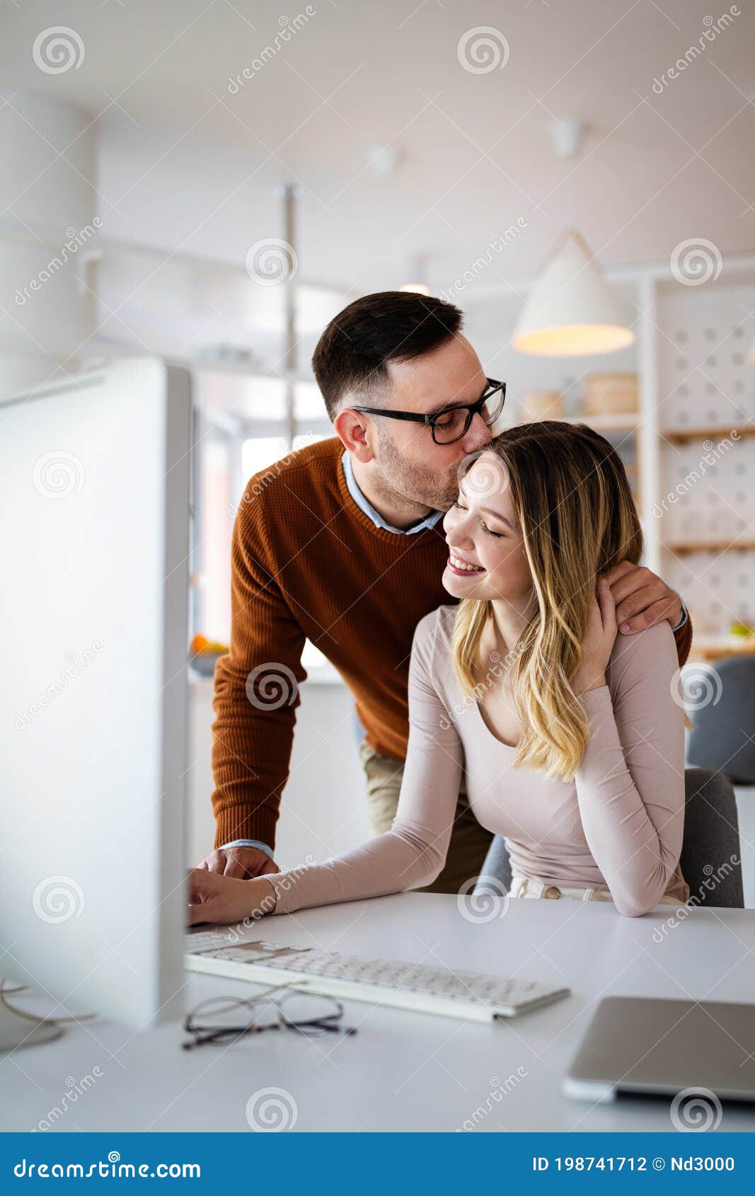 Happy Couple in Love Working Together on Computer. Stock Photo - Image ...