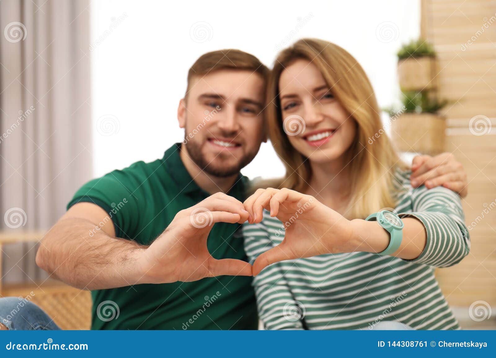 Happy Couple Making Heart with Their Hands Stock Image - Image of ...