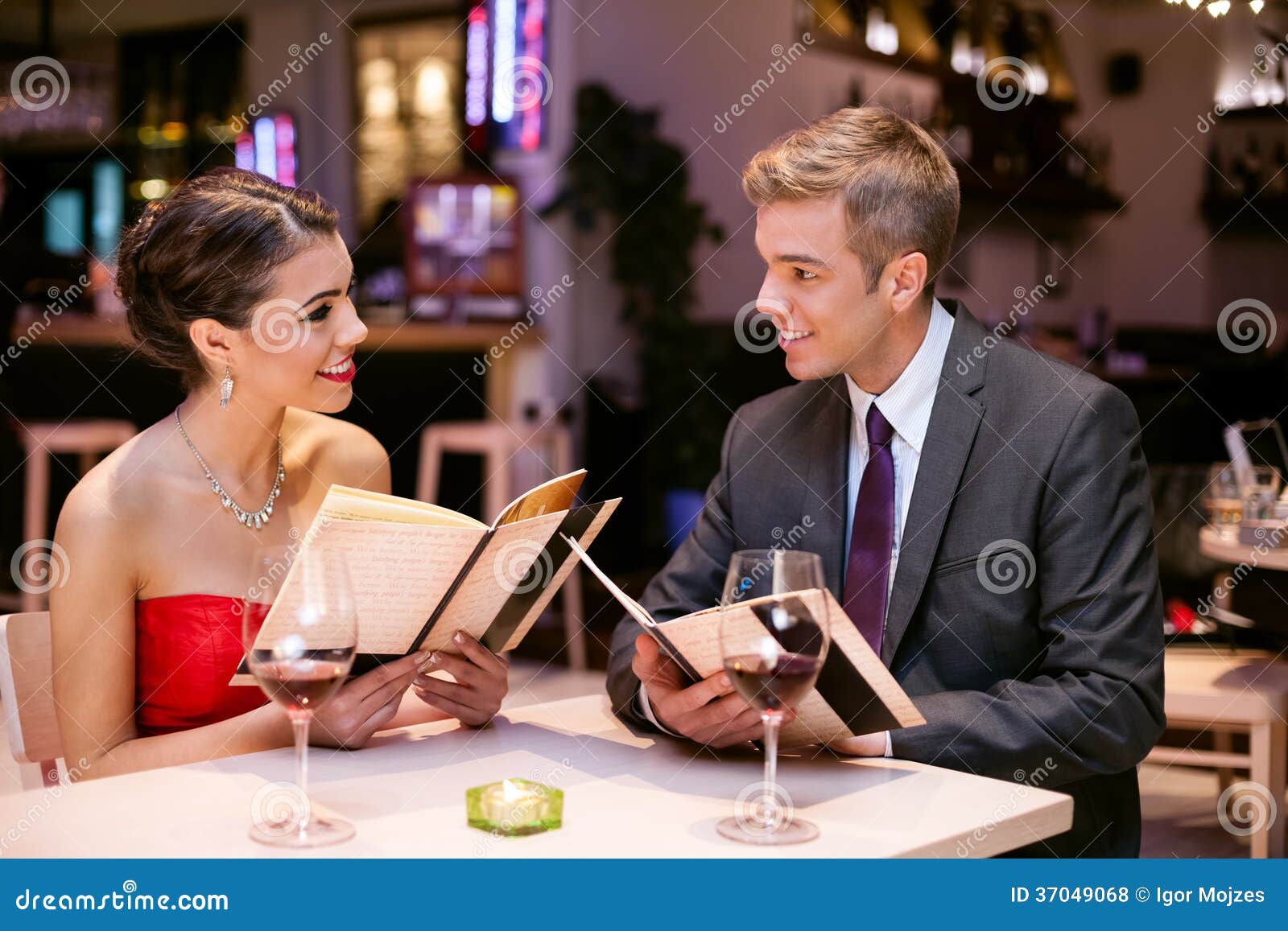 Happy Couple with Menu Card Stock Photo - Image of expressing, love ...