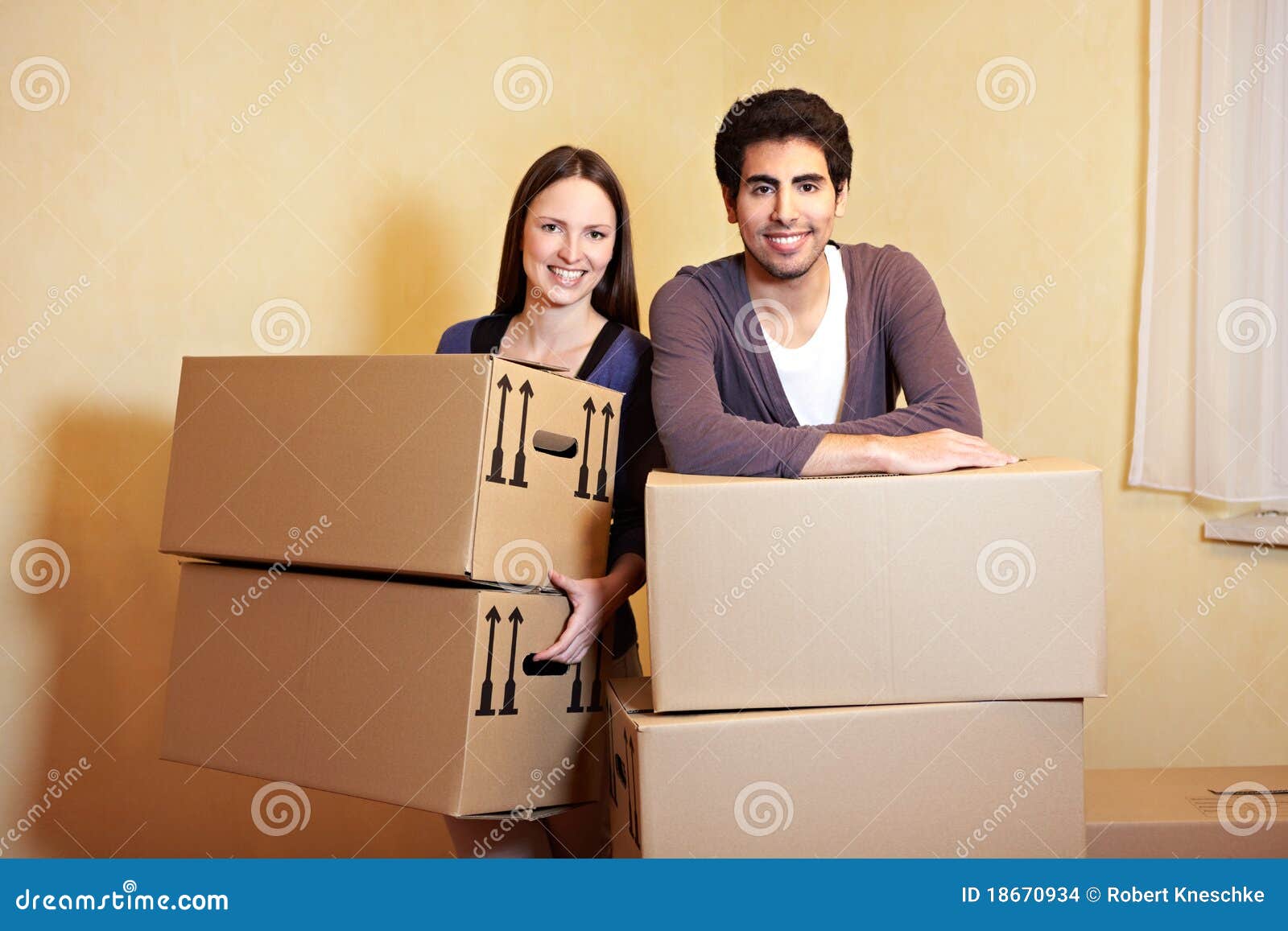 Happy couple moving house stock photo. Image of house - 18670934