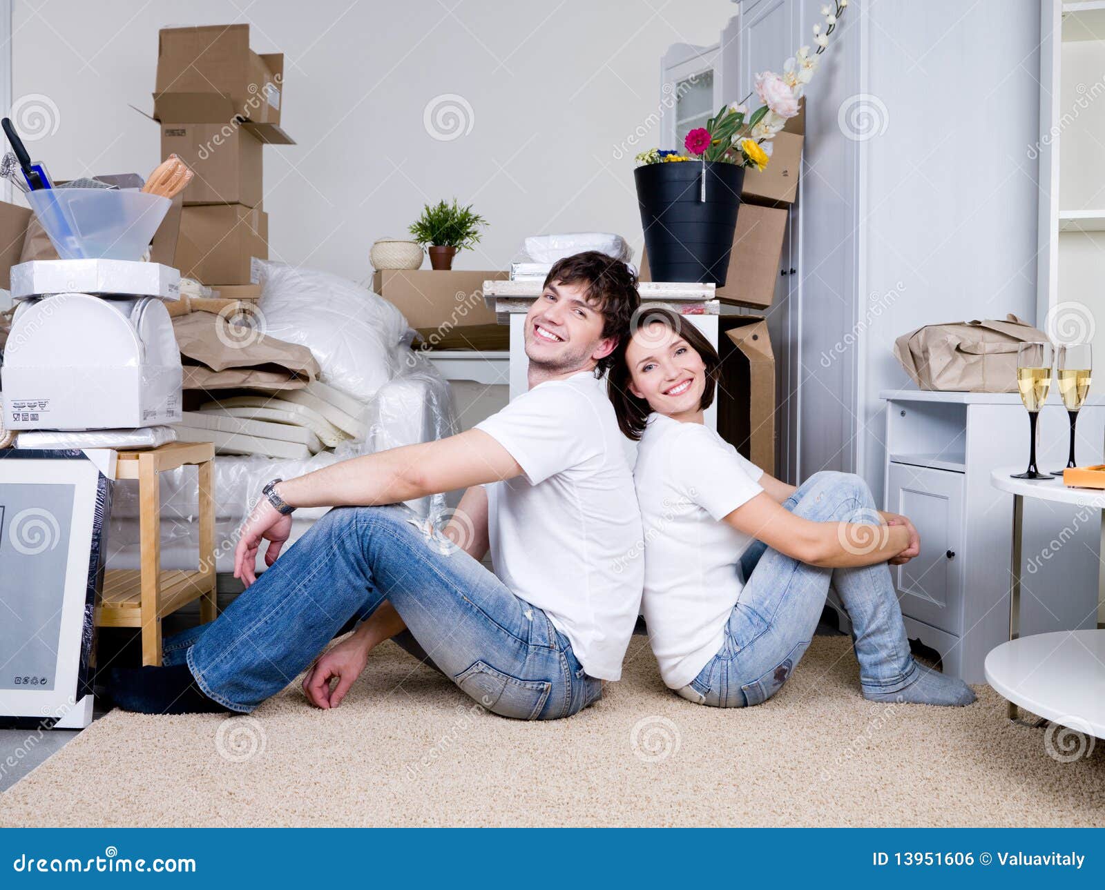 Happy Couple in the New Home Stock Photo - Image of adult, casual: 13951606