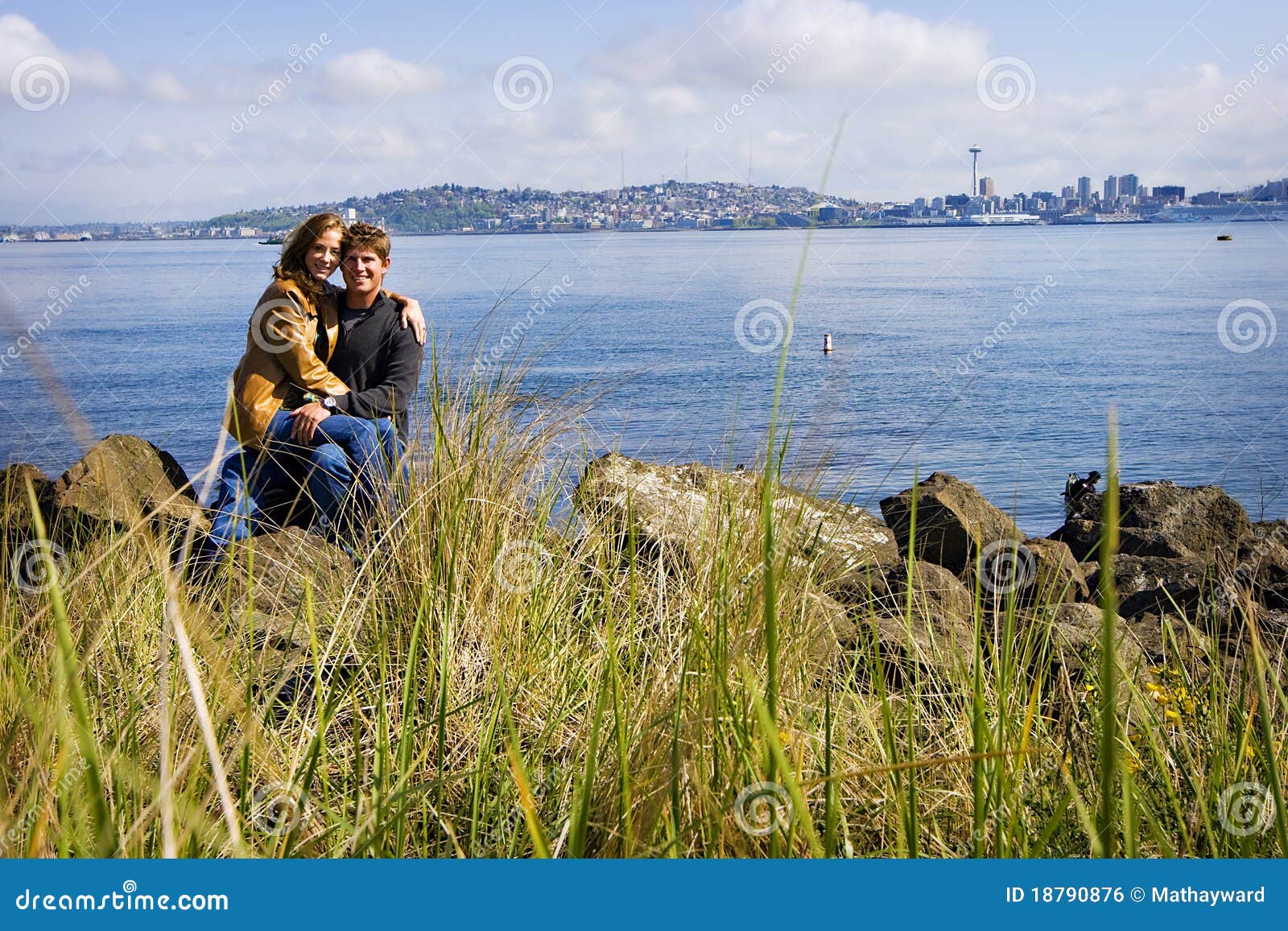 Happy Couple Outside stock photo. Image of sitting, grass - 18790876