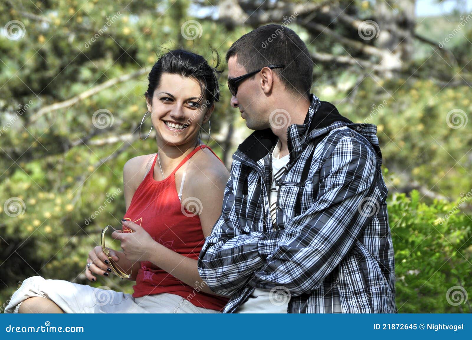 Happy couple outside stock image. Image of conversation - 21872645