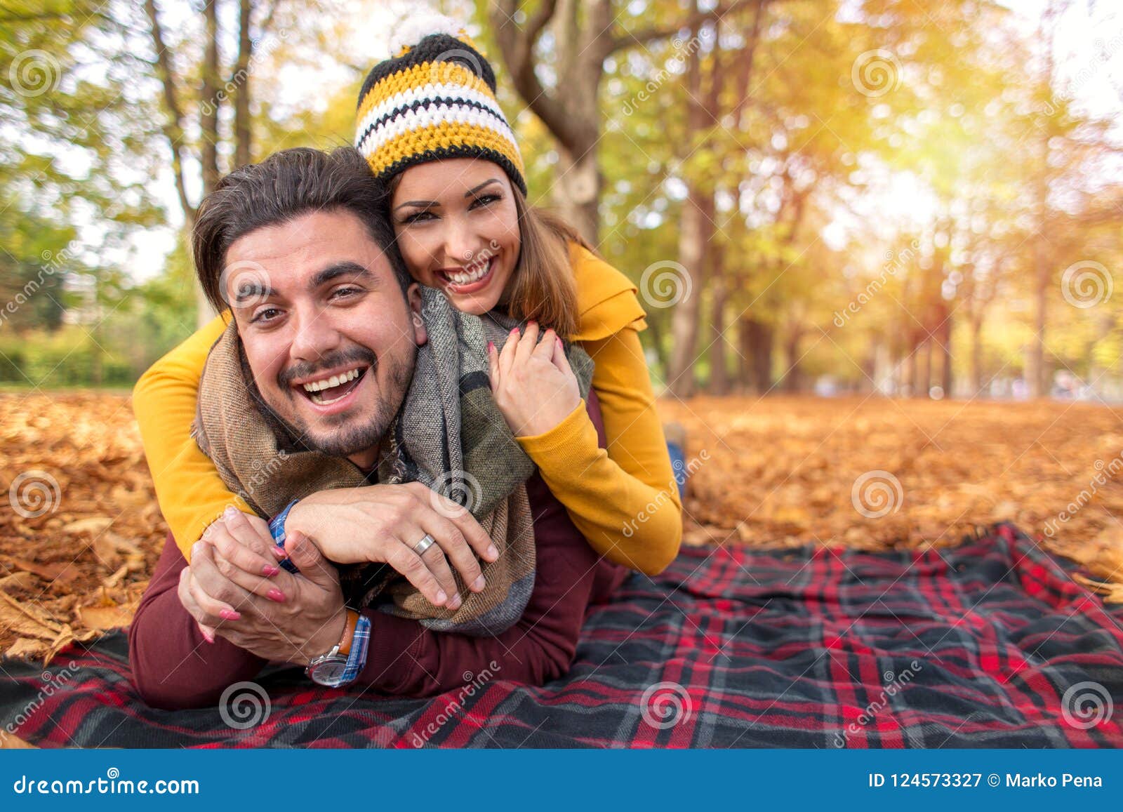 Happy Couple at a Park in Autumn Stock Image - Image of active, lying ...
