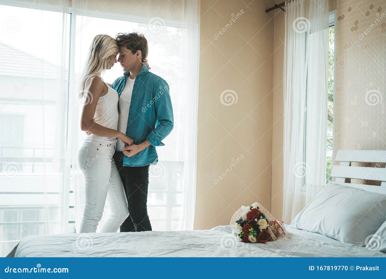 Happy Couple Playing Together Stock Photo - Image of morning, happy ...