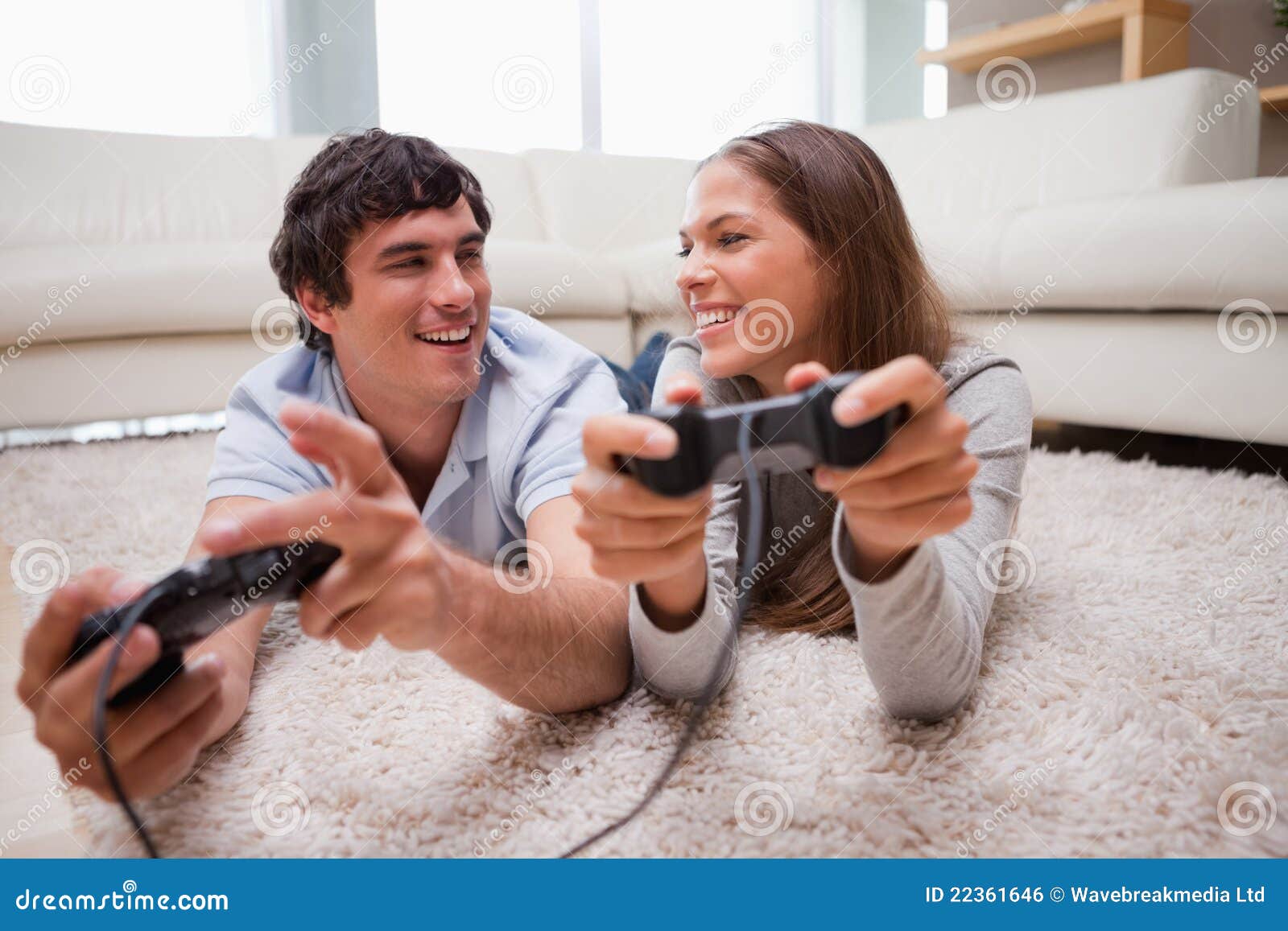 Happy Couple Playing Video Games Together Stock Photo - Image of living ... Happy Couple Playing Video Games Together Stock Photo - Image of living ...