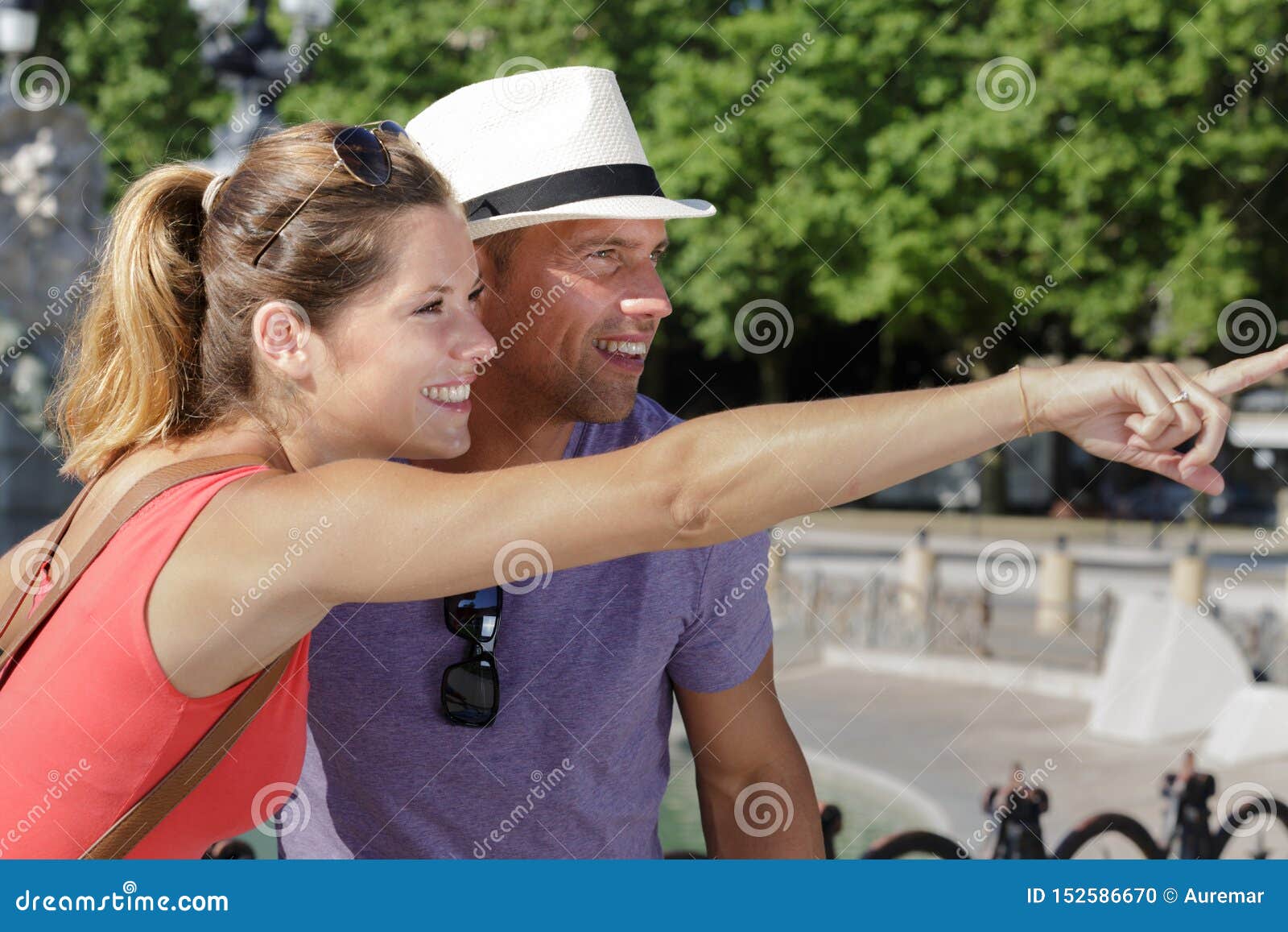 Happy Couple Pointing in Direction Stock Photo - Image of african ...