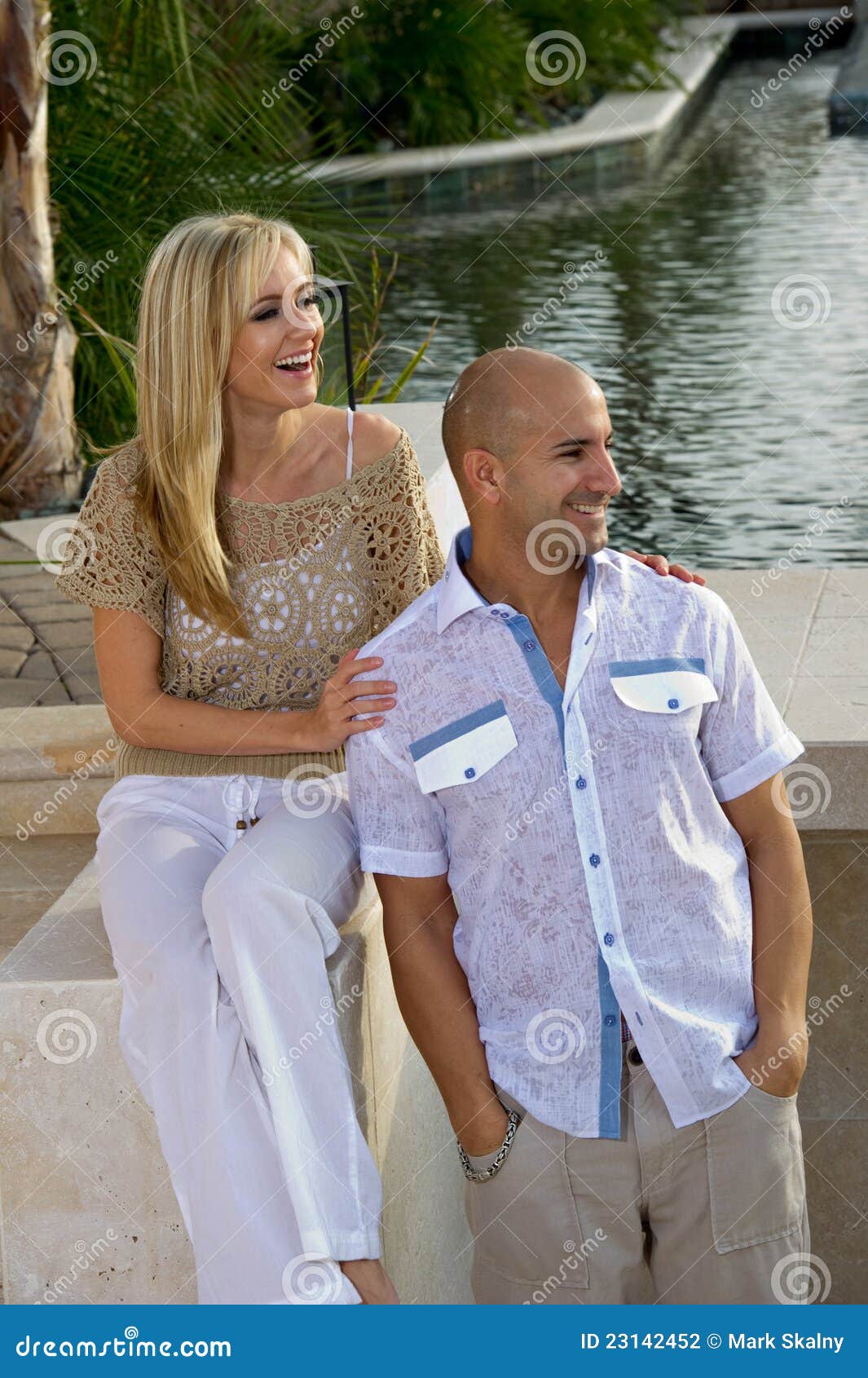 Happy Couple Posing by the Pool Stock Photo - Image of cheerful ...