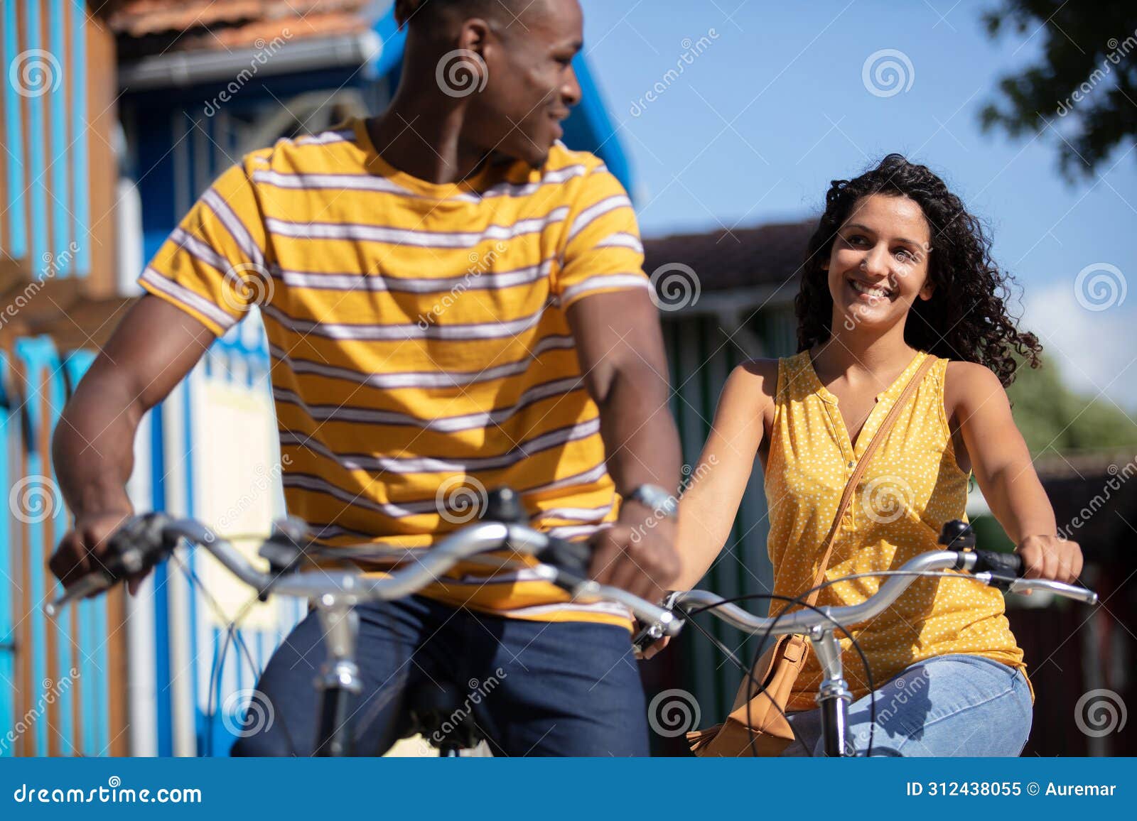 Happy Couple Racing on Bikes Stock Image - Image of holiday, field ...