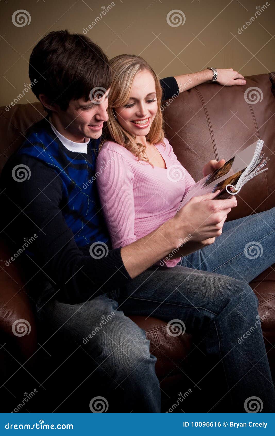 Happy couple reading stock photo. Image of home, lovers - 10096616
