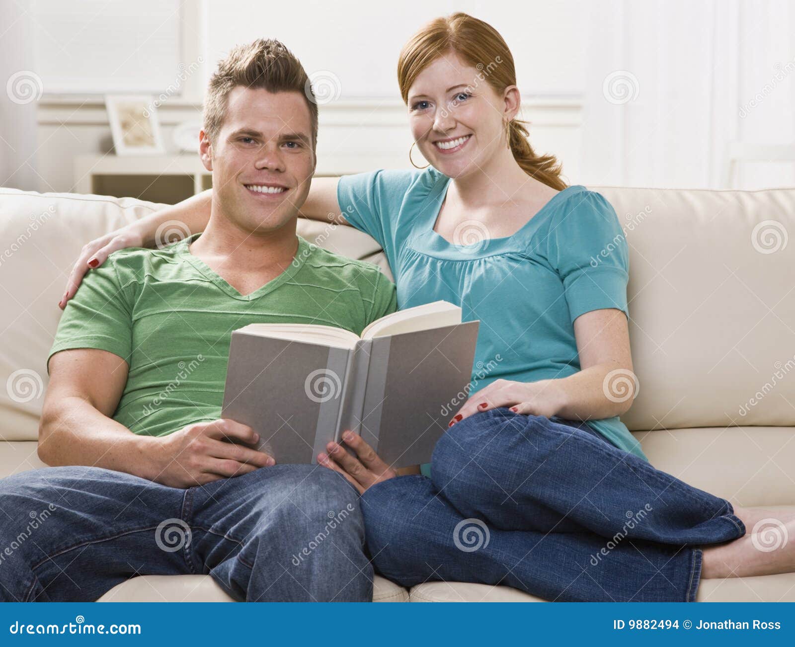 Happy Couple Reading Together Stock Photo - Image of calm, eyes: 9882494