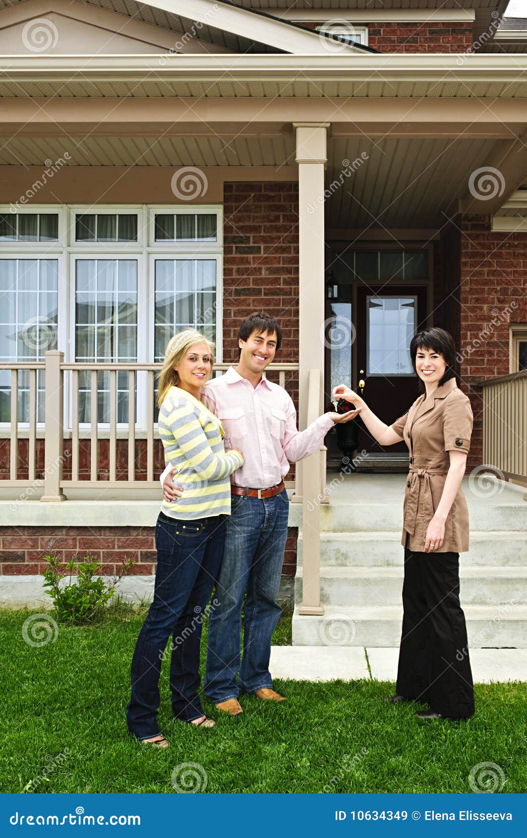 Happy Couple with Real Estate Agent Stock Image - Image of entrance ...