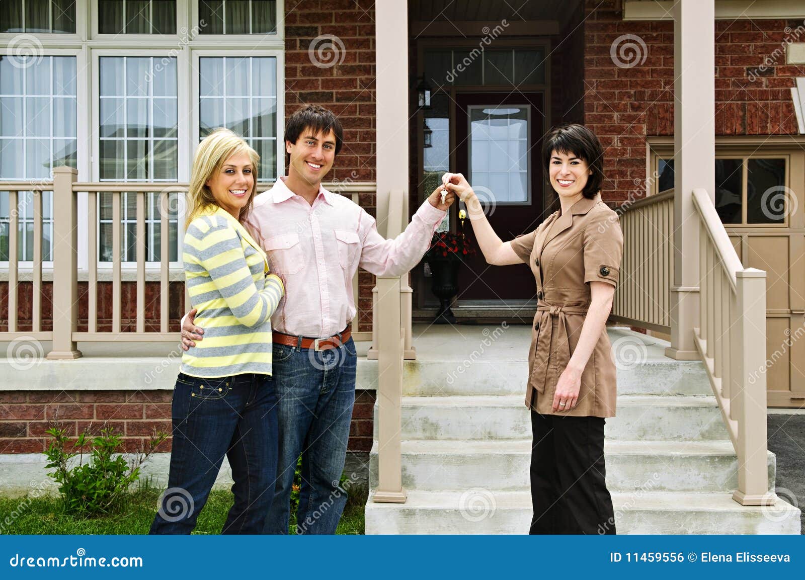 Happy Couple with Real Estate Agent Stock Photo - Image of give, home ...