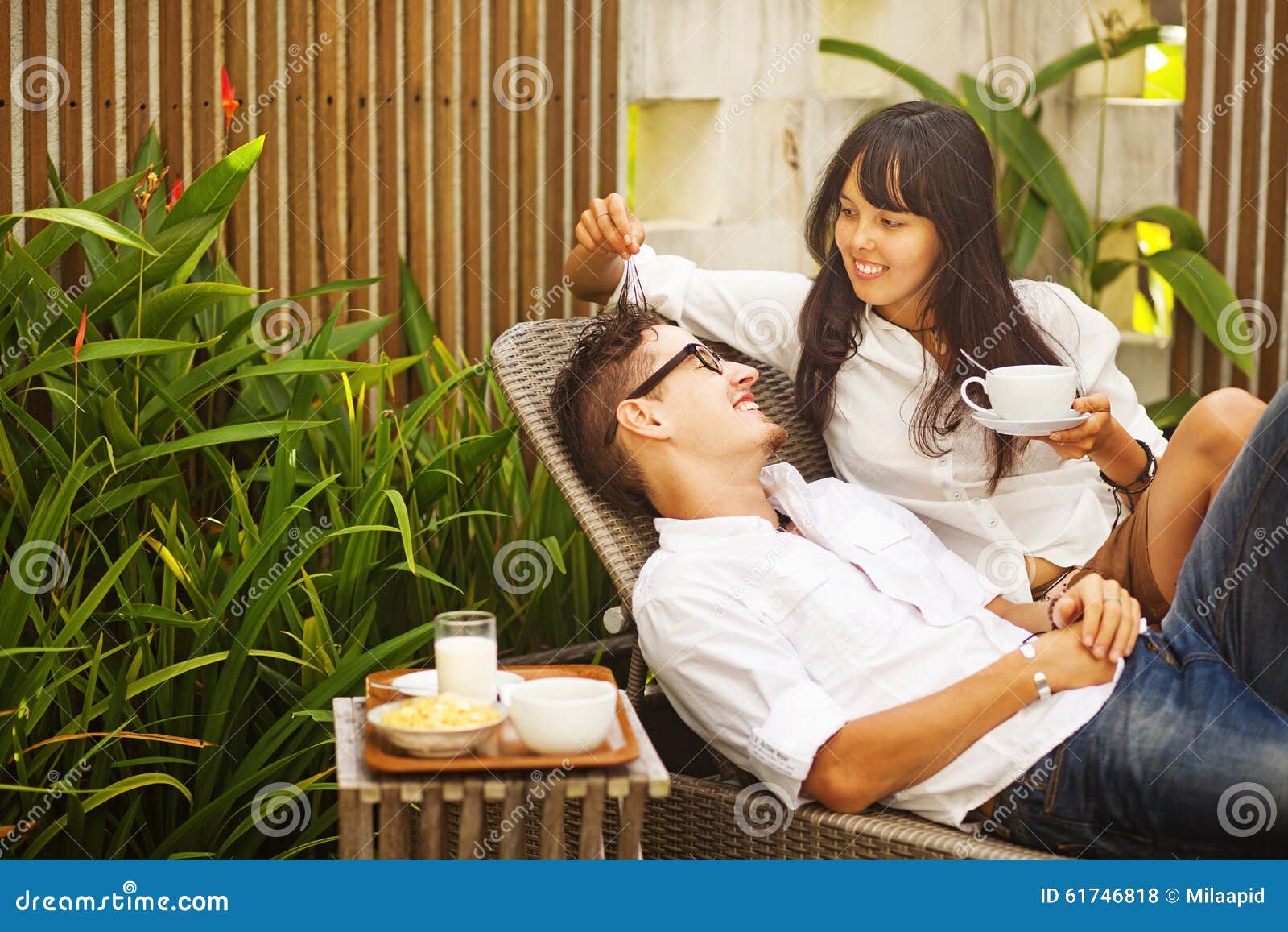 Happy couple in resort stock photo. Image of eating, interior - 61746818