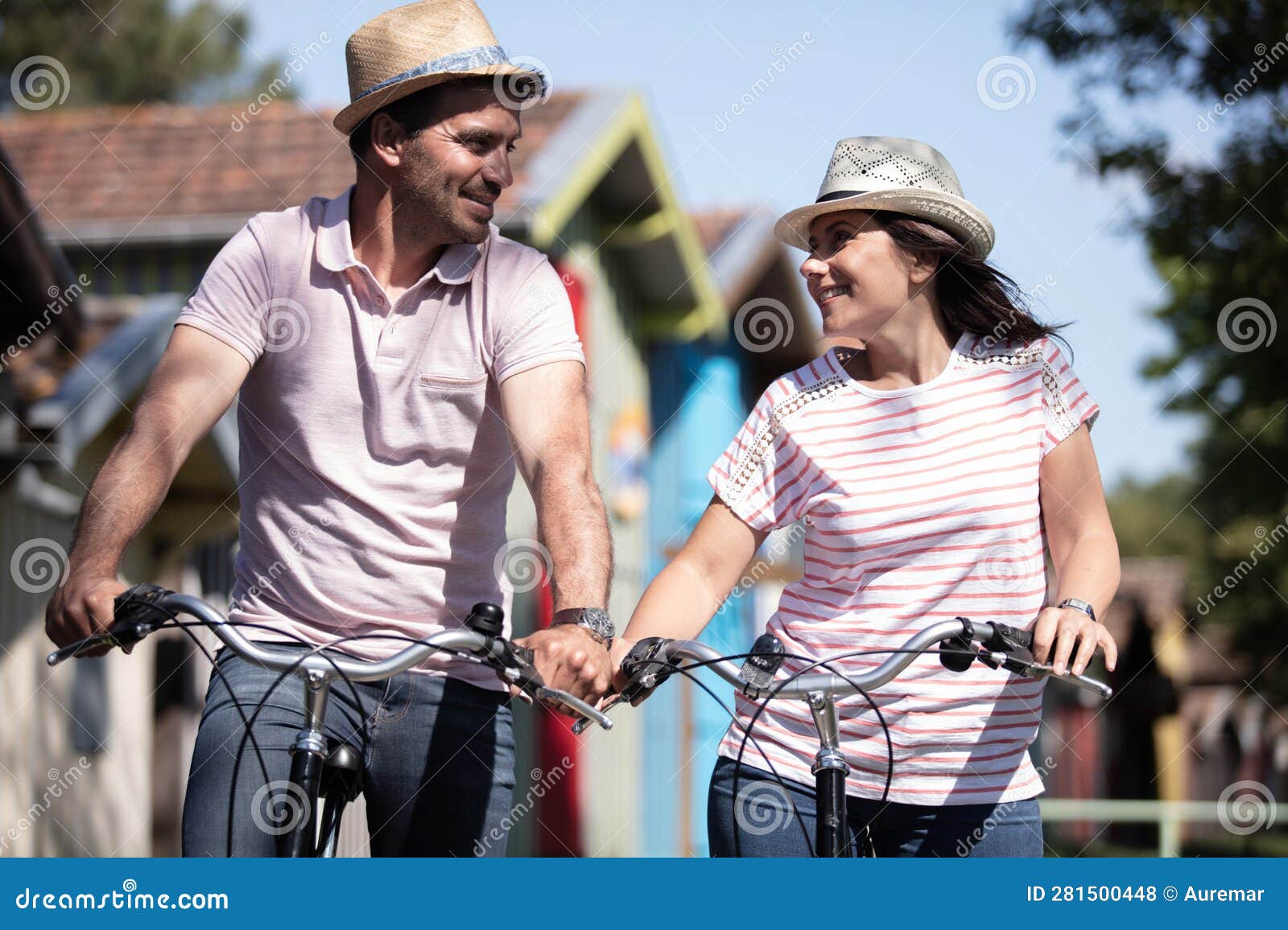 Happy Couple Riding Bicycle Together Stock Photo - Image of ...