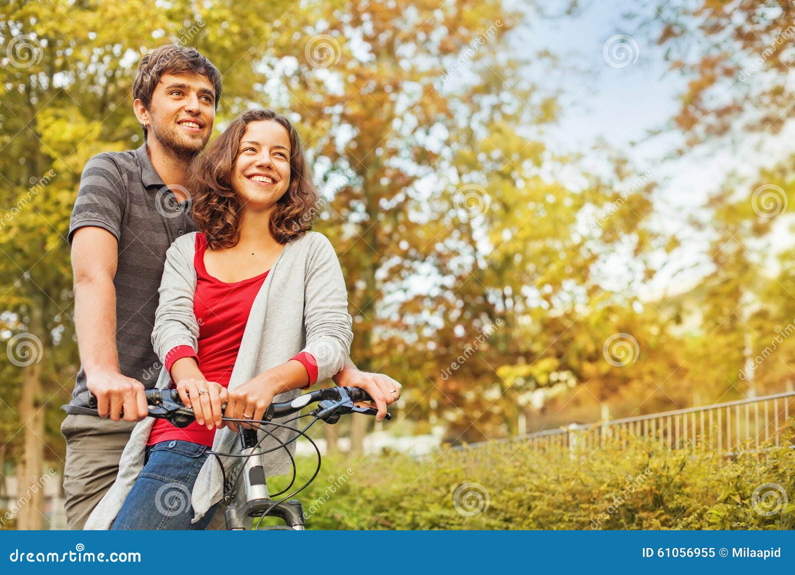 Happy Couple Riding on a Same Bike Stock Image - Image of cycling ...