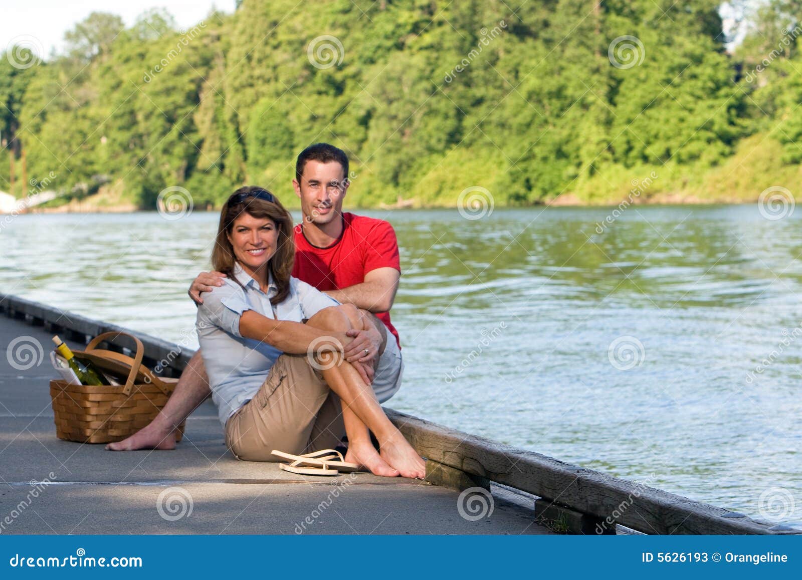 Happy Couple by a River - Horizontal Stock Image - Image of wife, woman ...