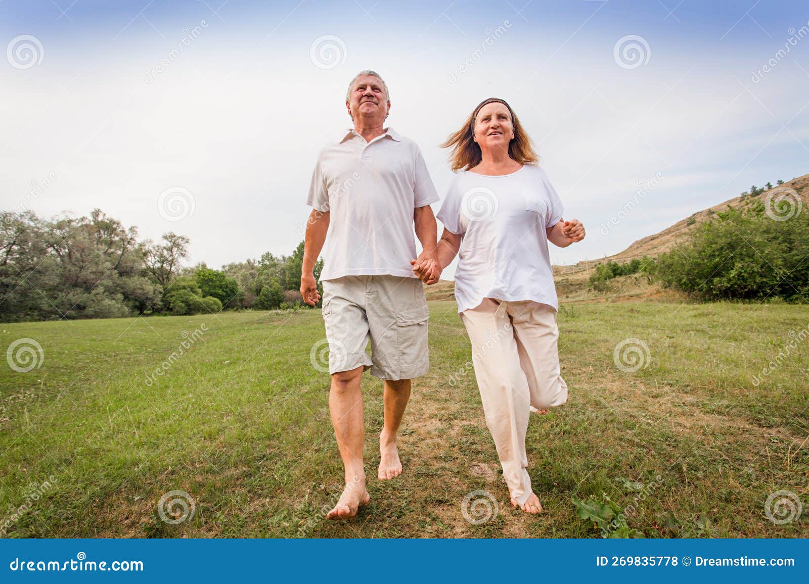 Happy couple running stock photo. Image of exercise - 269835778