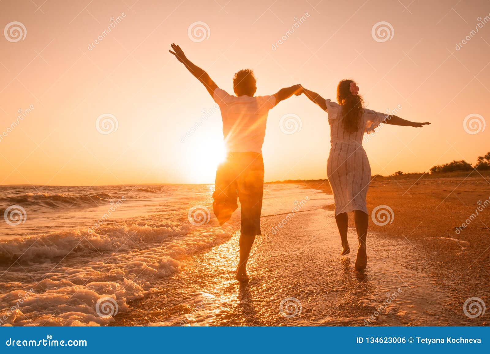 Happy Couple Running on the Beach Stock Photo - Image of lovers, beauty ...