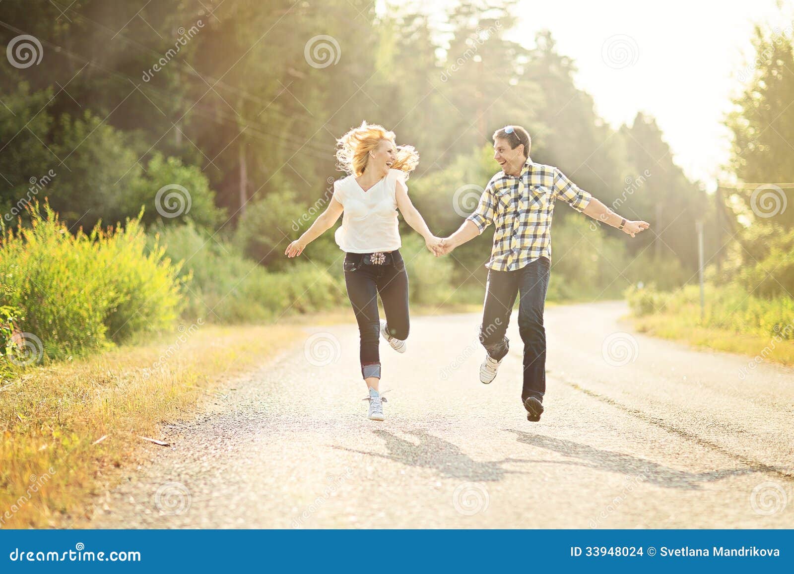 Happy couple running stock photo. Image of husband, smily - 33948024