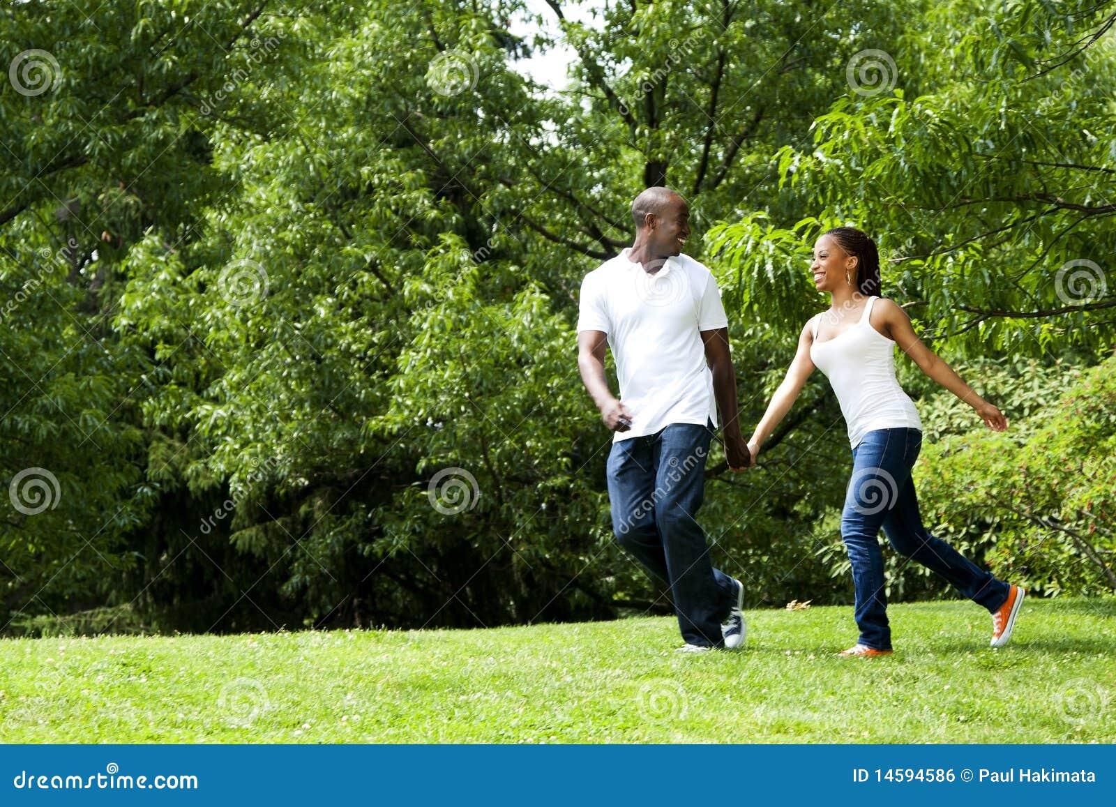 Happy Couple Running in Park Stock Photo - Image of woman, shirt: 14594586