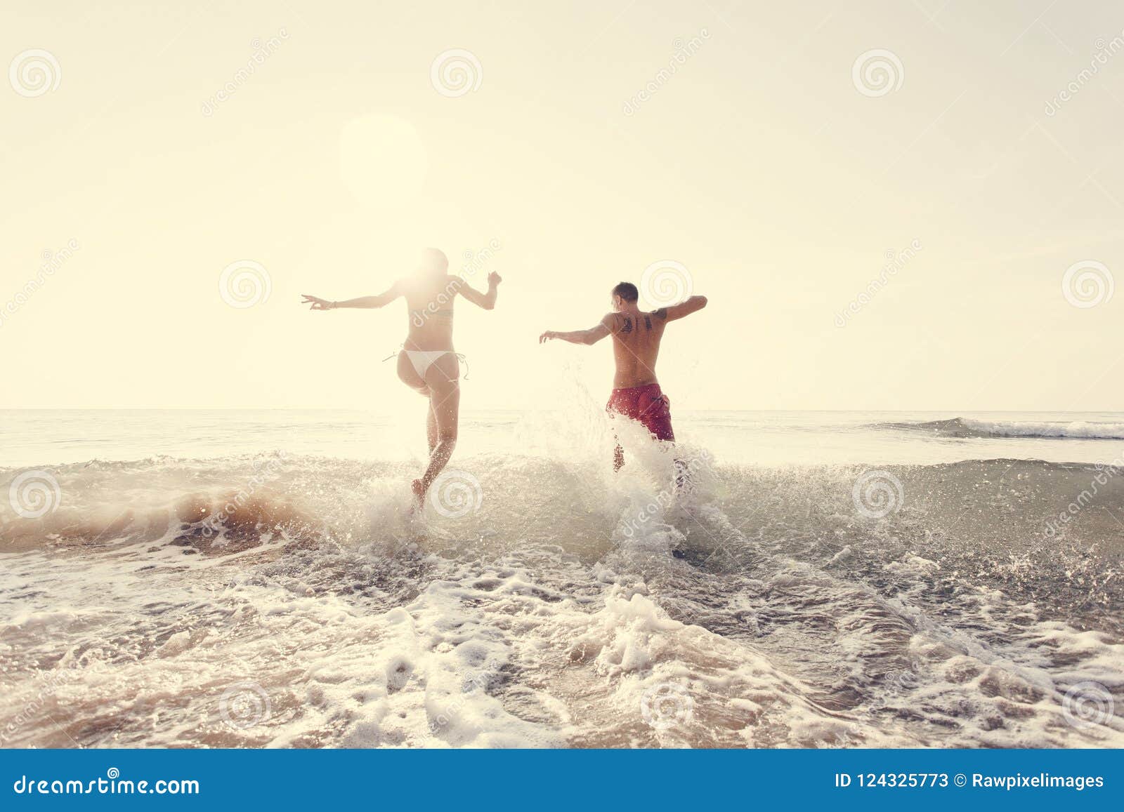 Happy Couple Running To the Sea Stock Image - Image of running, beach ...