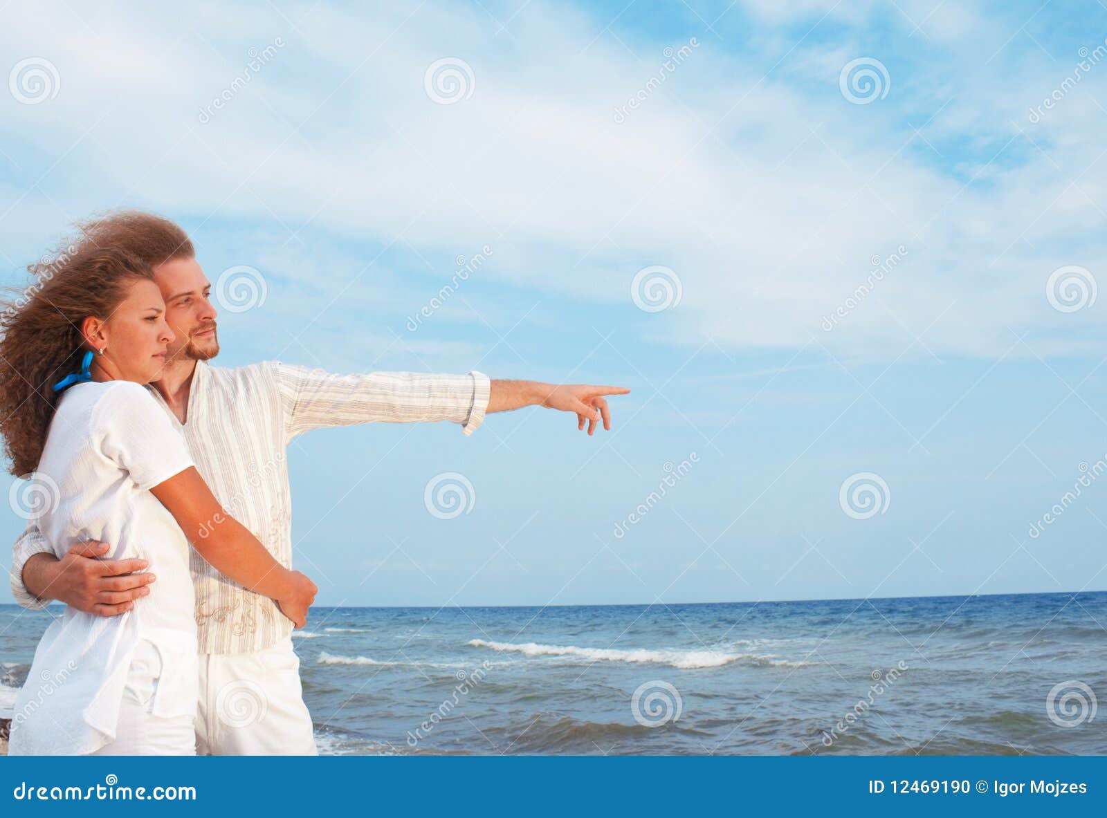 Happy couple on sea stock photo. Image of male, romantic - 12469190