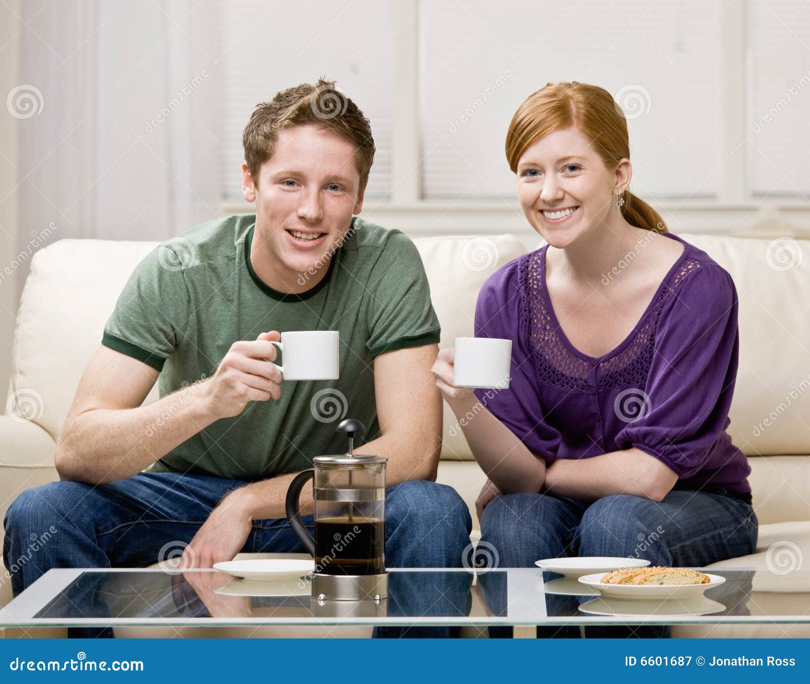 Happy Couple Sitting on Sofa Drinking Fresh Coffee Stock Image - Image ...