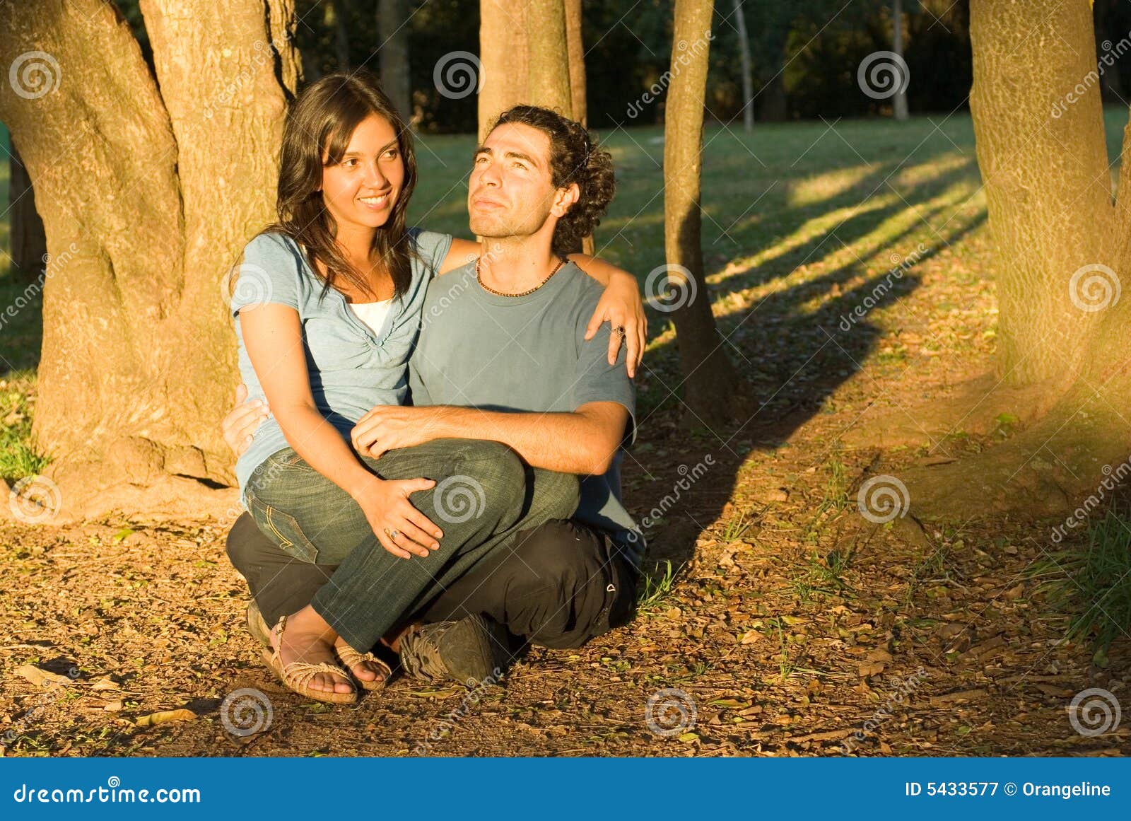 Happy Couple Sitting in the Woods. Horizontal Stock Image - Image of ...