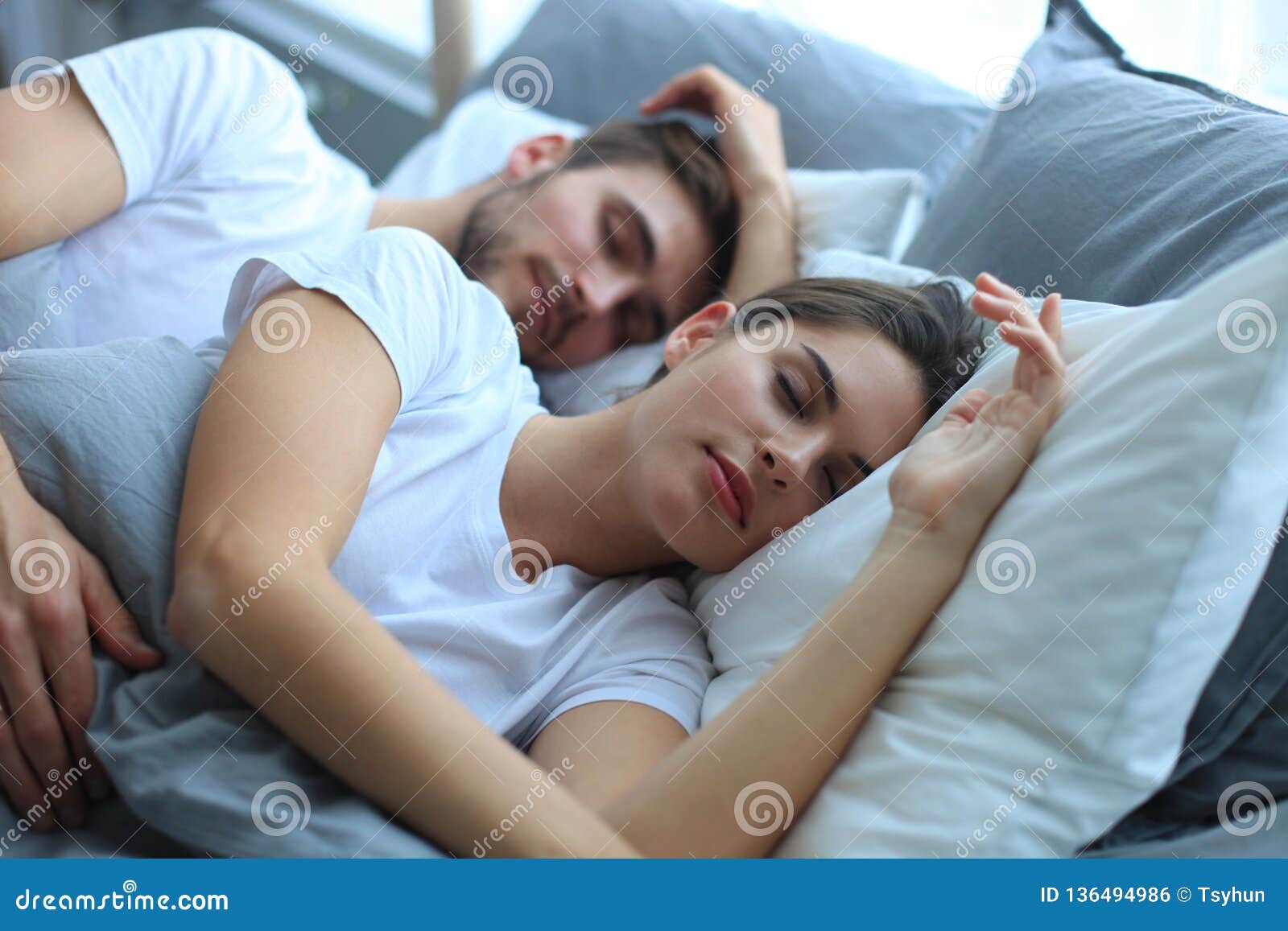 Happy Couple Sleeping in a Comfortable Bed at Home. Stock Photo - Image ...