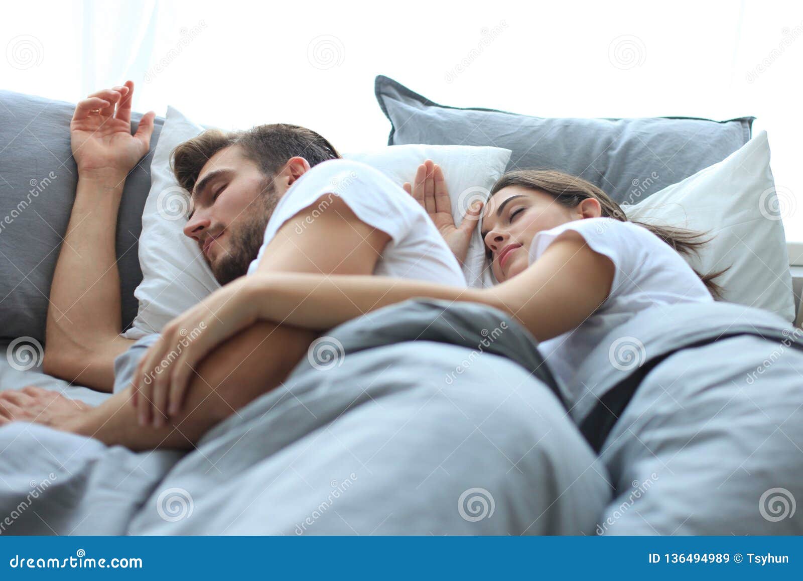 Happy Couple Sleeping in a Comfortable Bed at Home. Stock Image - Image ...