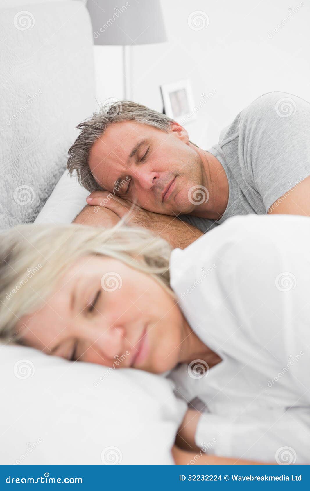 Happy Couple Sleeping Peacefully Stock Photo - Image of pajamas, house ...