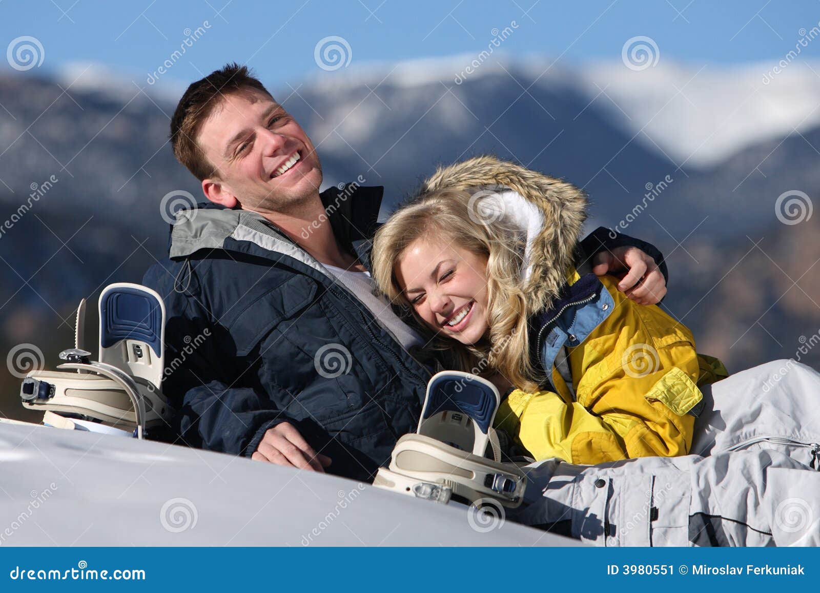 Happy Couple Snowboarding at Ski Resort Stock Image - Image of ...