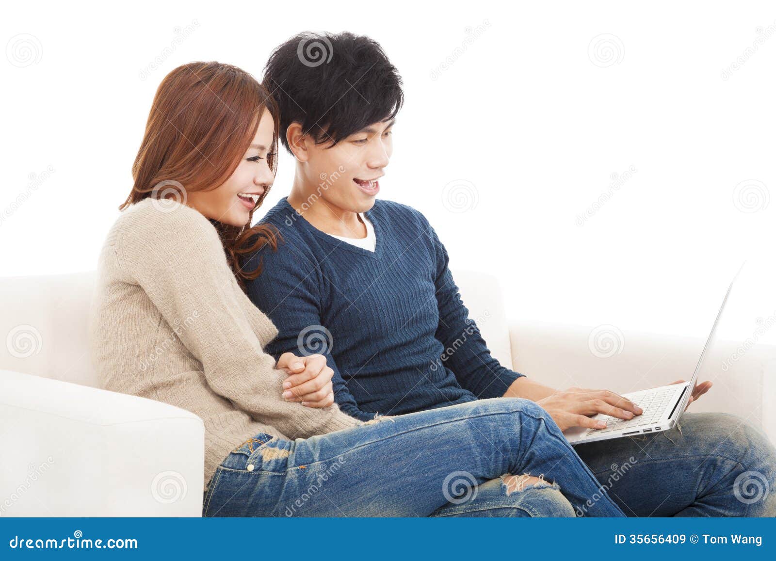 Happy Couple in Sofa with Laptop at Home Stock Image - Image of ...