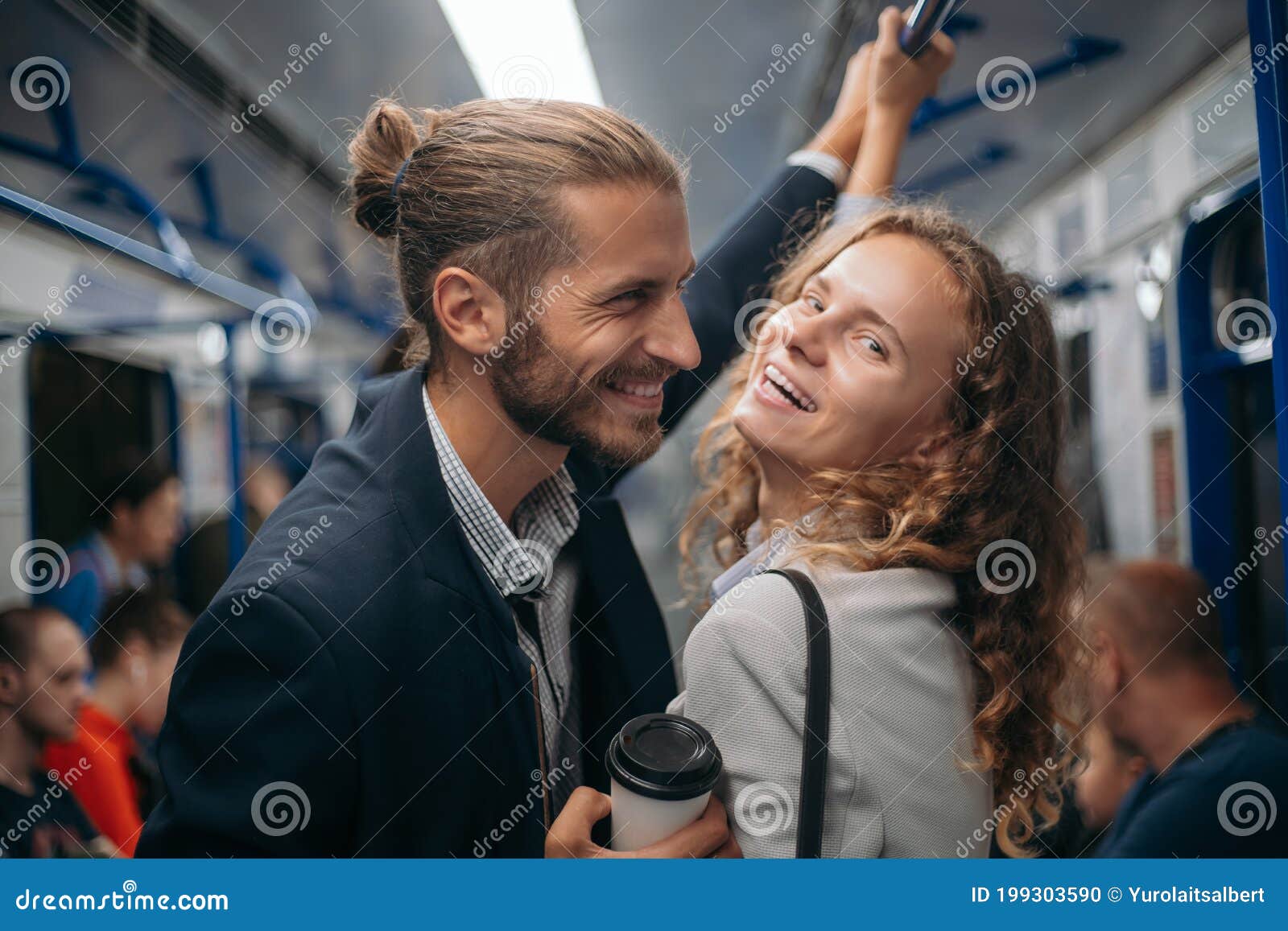 Happy Couple Standing in a Subway Train. Stock Photo - Image of ...