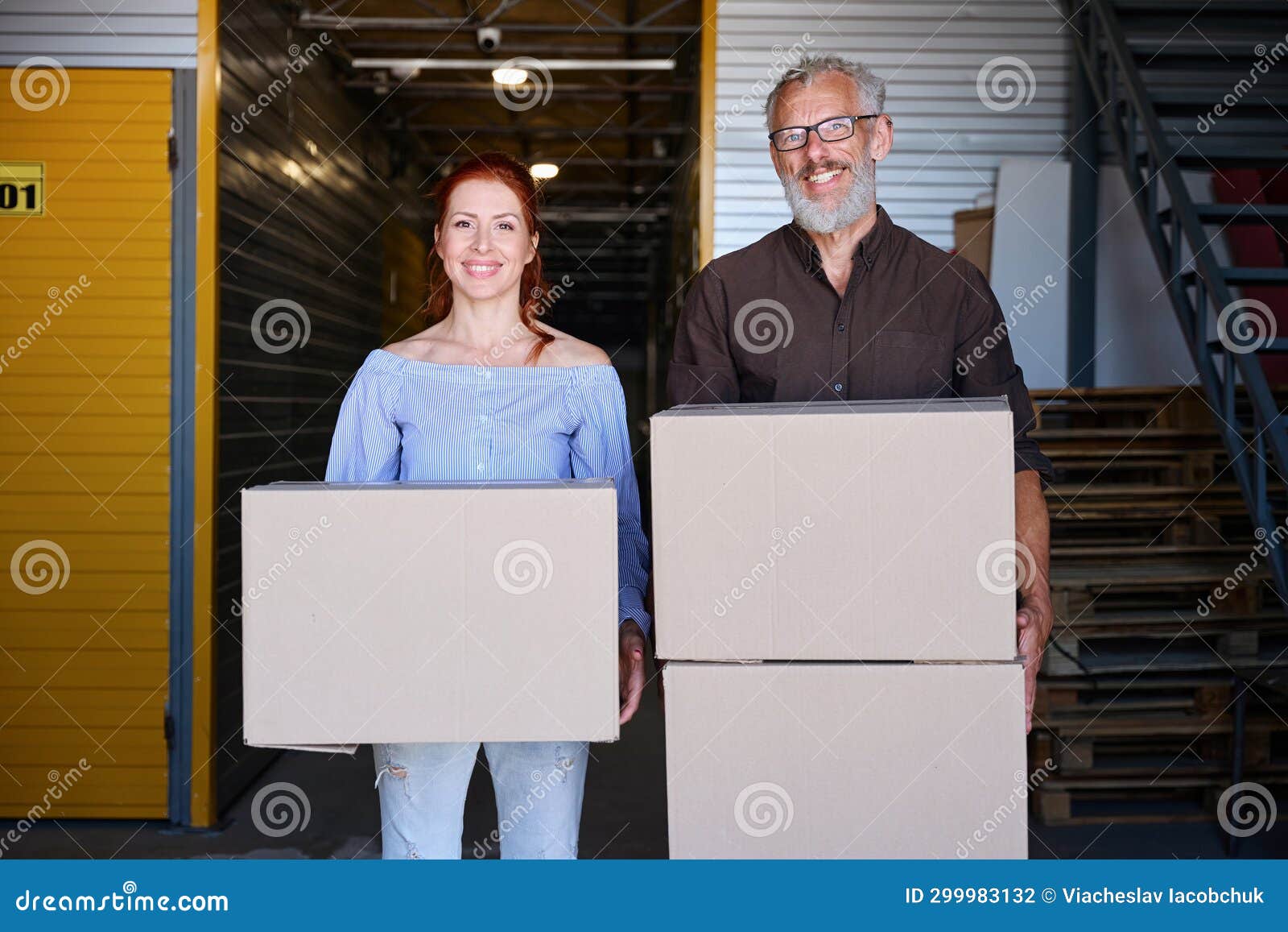 Happy Couple is in Storage Warehouse Stock Photo - Image of warehouse ...
