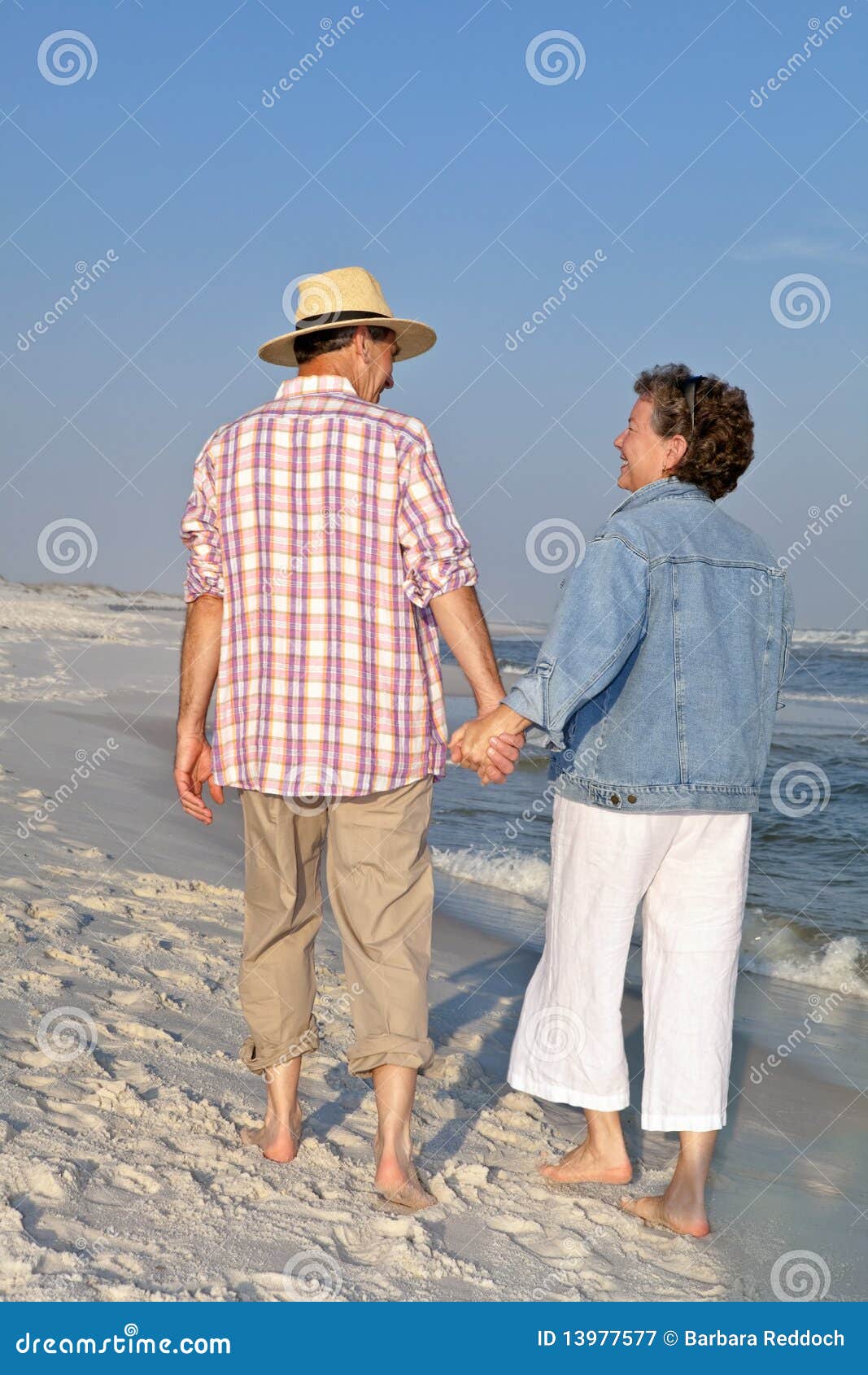 Happy Couple Strolling on Beach at Sunset Stock Image - Image of ...