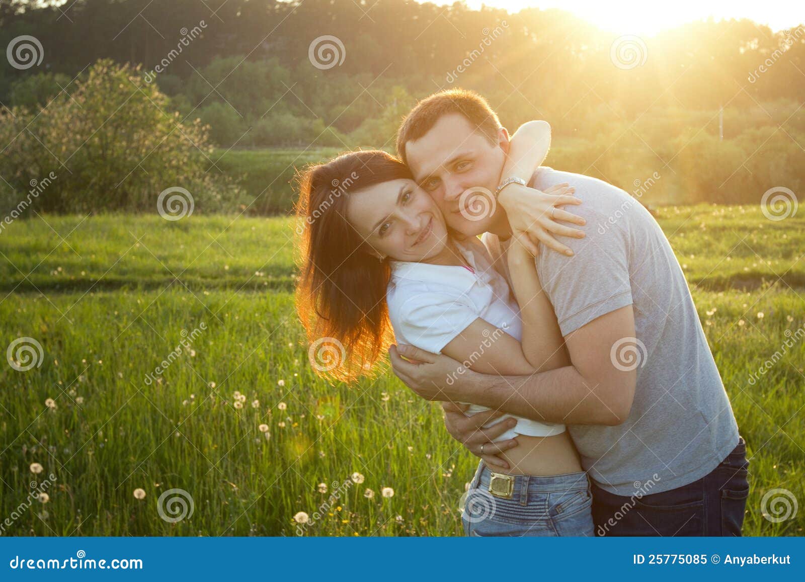 Happy couple at sunset stock image. Image of nature, casual - 25775085
