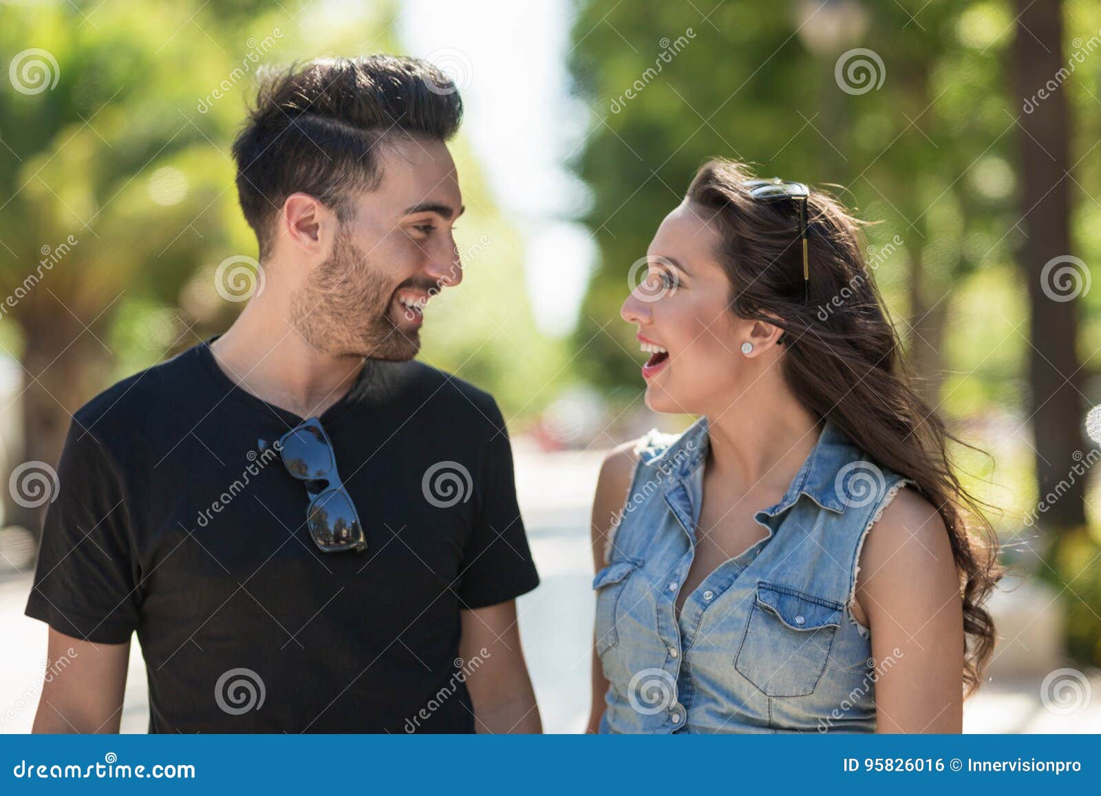 Happy Couple Talking Outside Smiling Stock Photo - Image of life ...