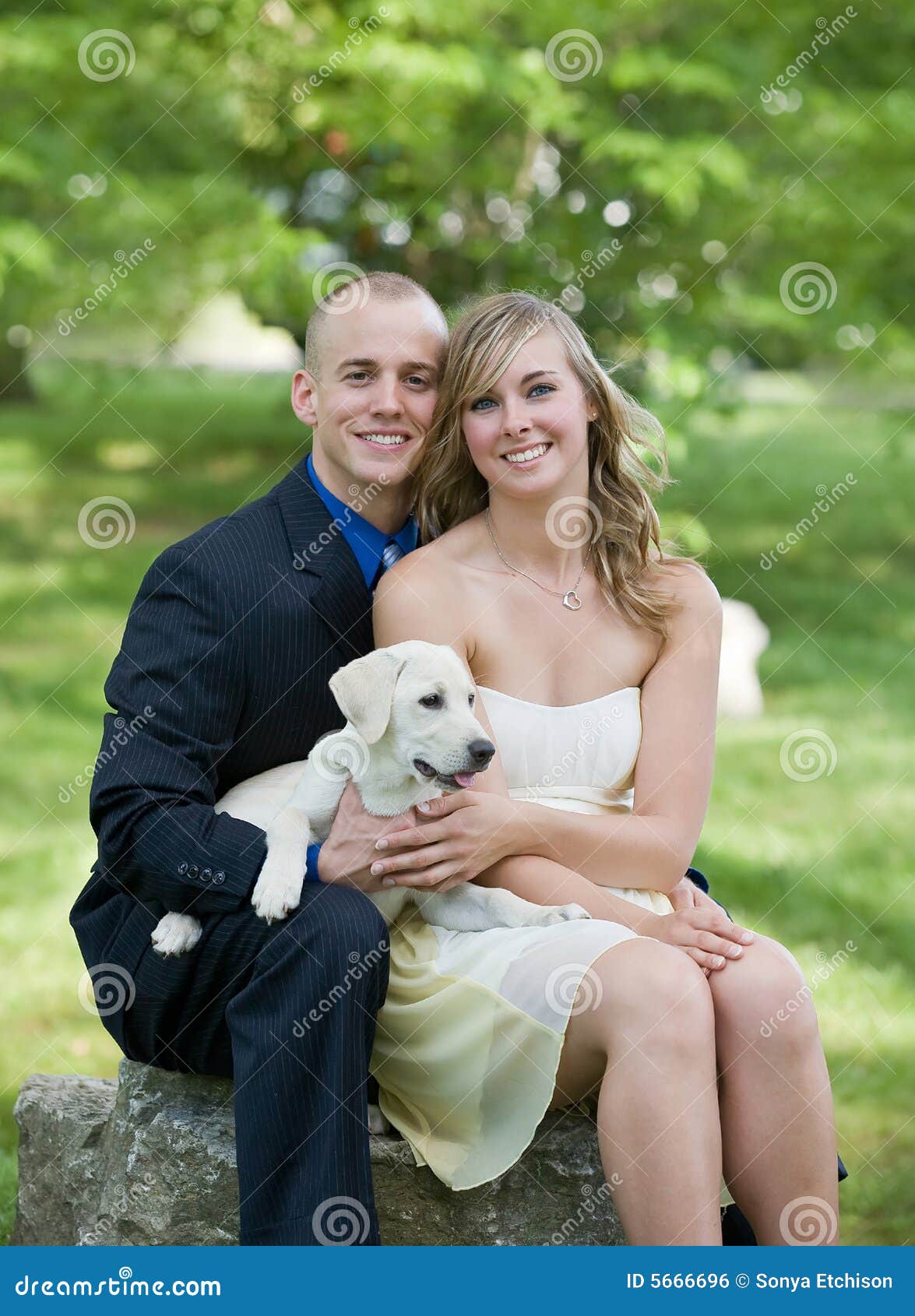 Happy Couple with Their Dog Stock Photo - Image of handsome, females ...